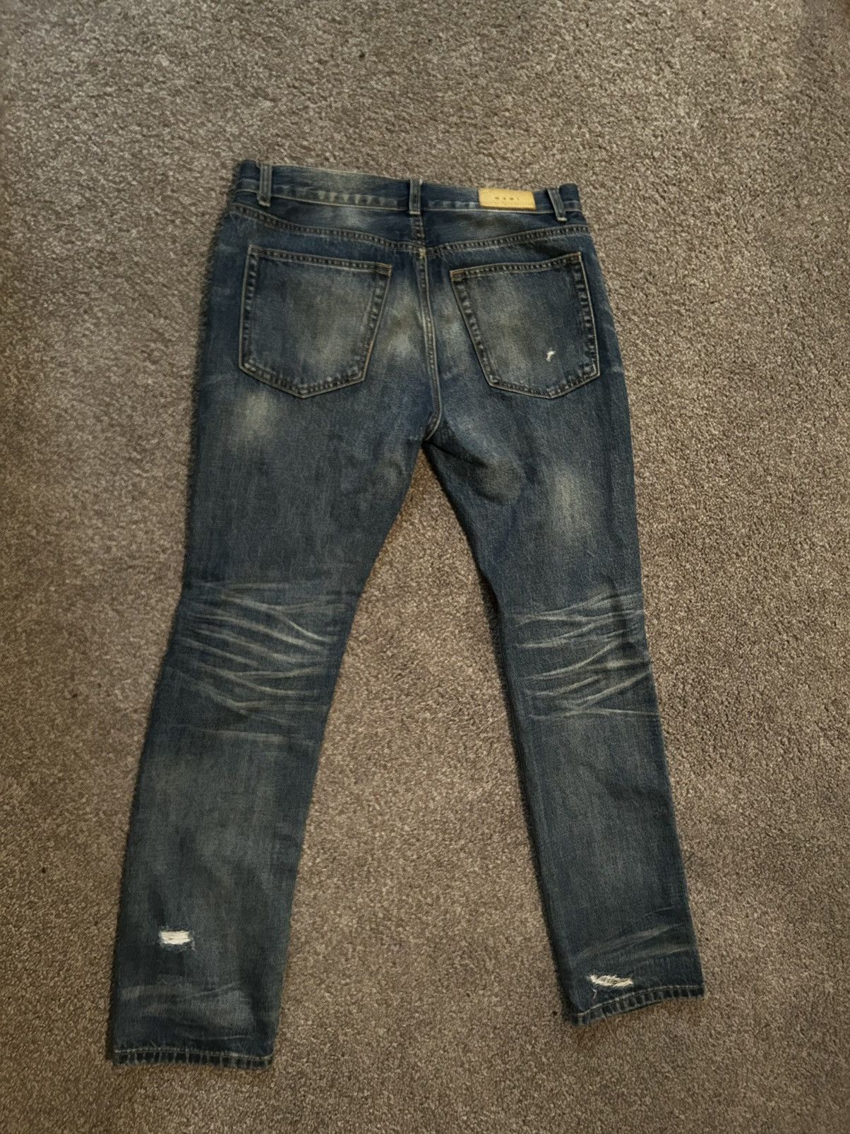 MNML Denim ripped pants | Grailed