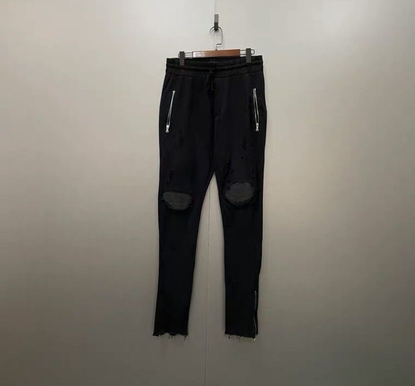 Amiri AMIRI black zipper split leather pants with holes | Grailed