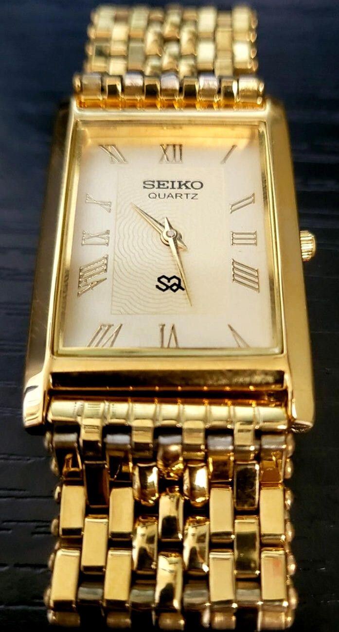 Seiko 🔥NOS RARE Vintage Seiko Slim Tank Quartz Men's Gold Watch | Grailed