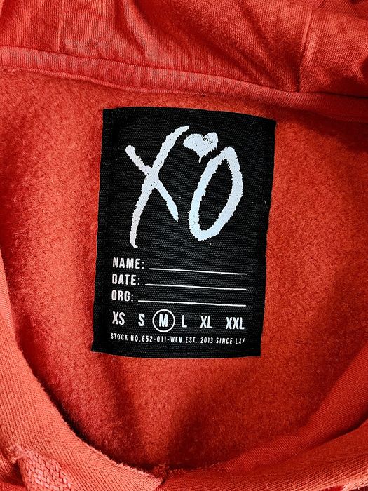 The Weeknd Official The Weeknd orange 'XO' hoodie | Grailed