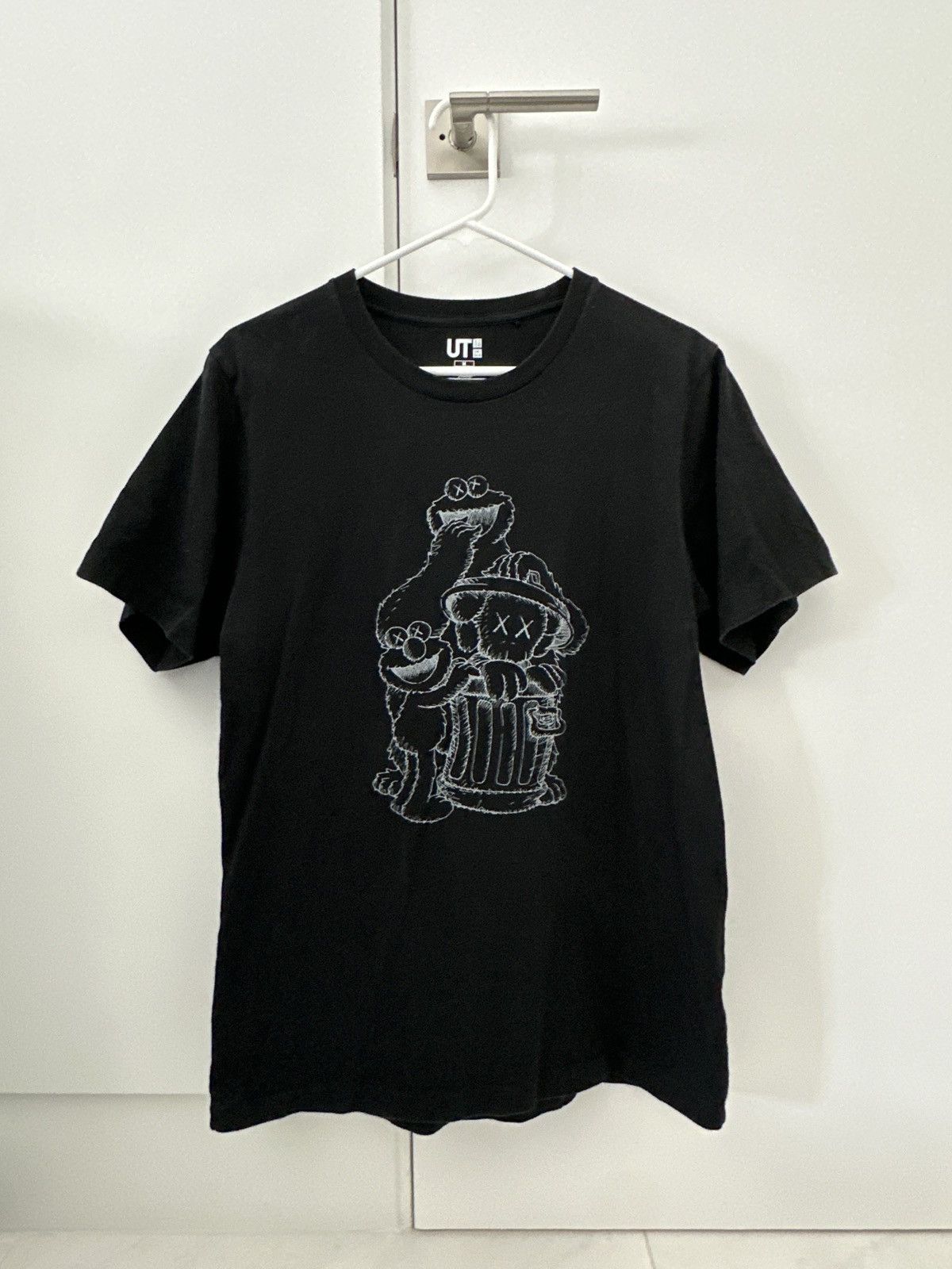 Uniqlo KAWS Uniqlo Sesame Street Companion Trash Can Outline Tee | Grailed