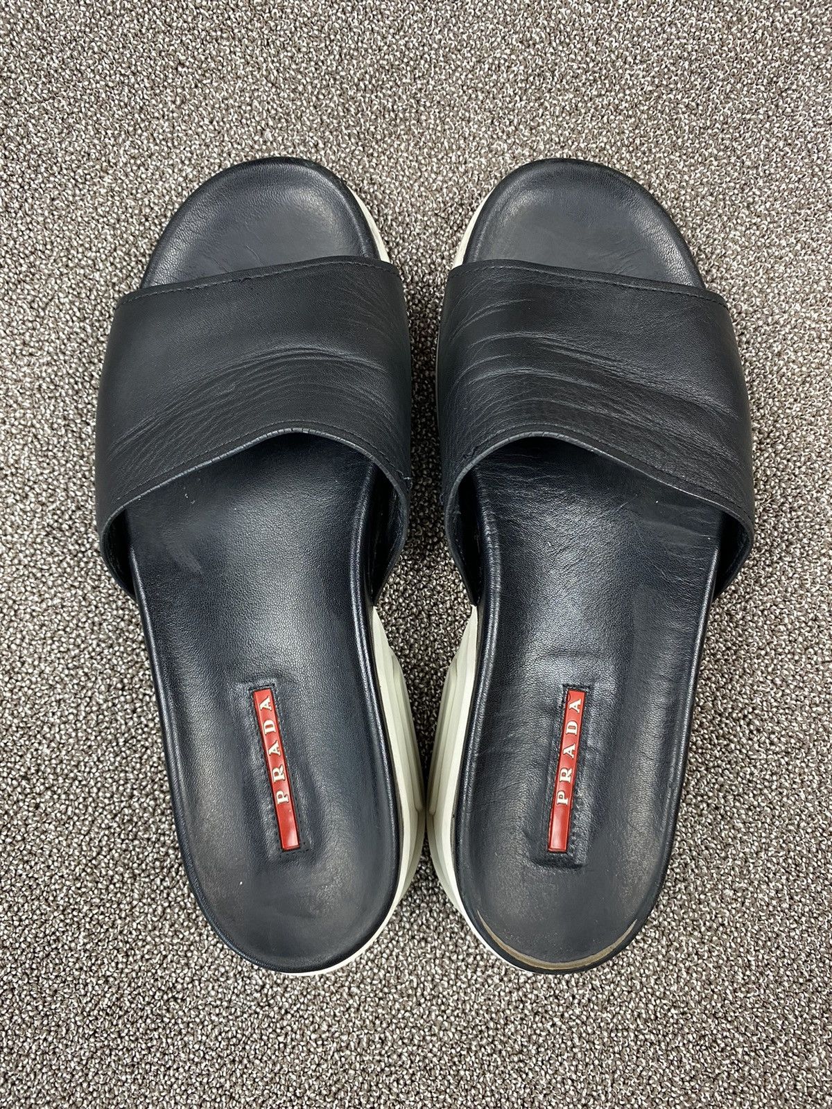 Prada Black basic logged Prada slides | Grailed