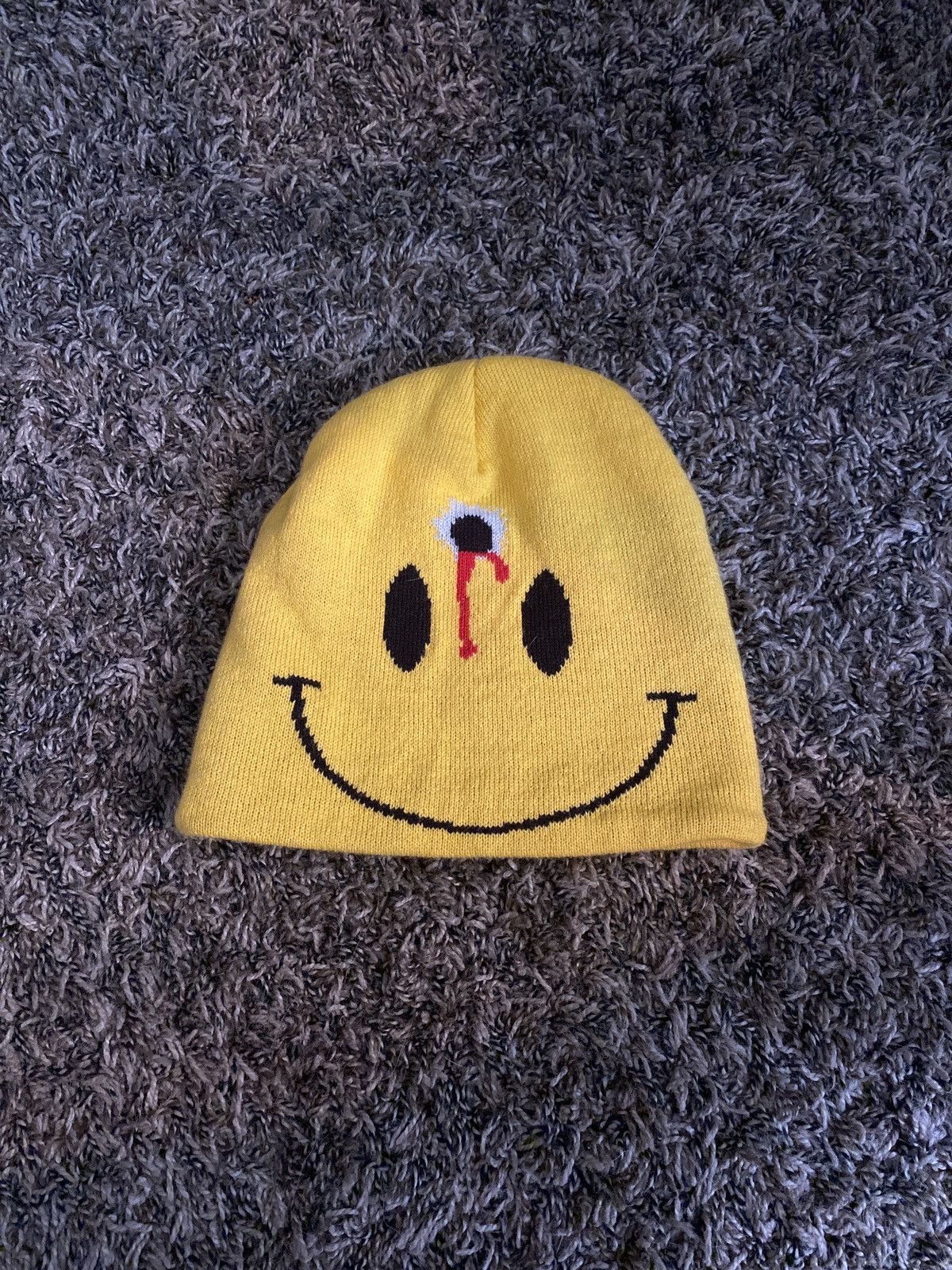 Supreme smiley face bullet hole beanie | Grailed