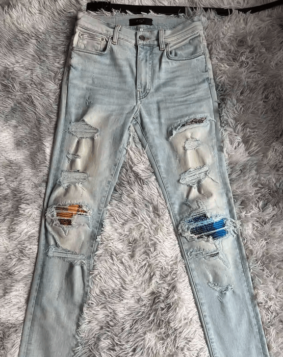 Amiri Amiri ripped jeans | Grailed