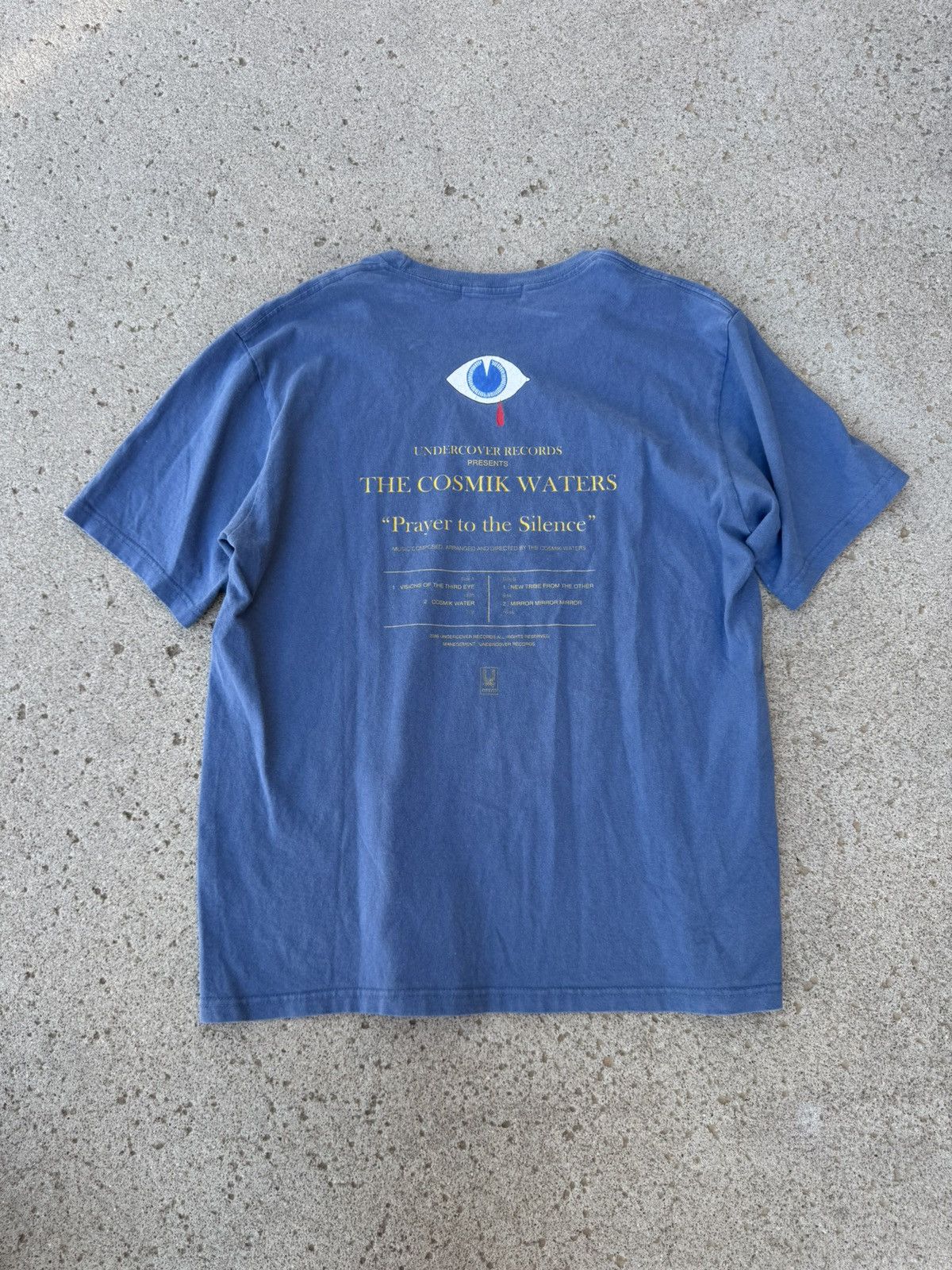 Undercover Undercover Cosmik Waters Eyeball Logo Tee | Grailed