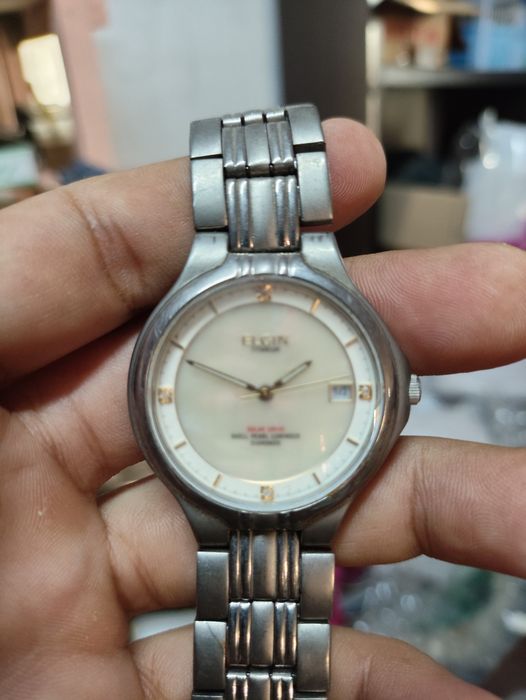 Vintage VINTAGE ELGIN TITANIUM SOLAR (NEED REPLACE BATTERY) | Grailed