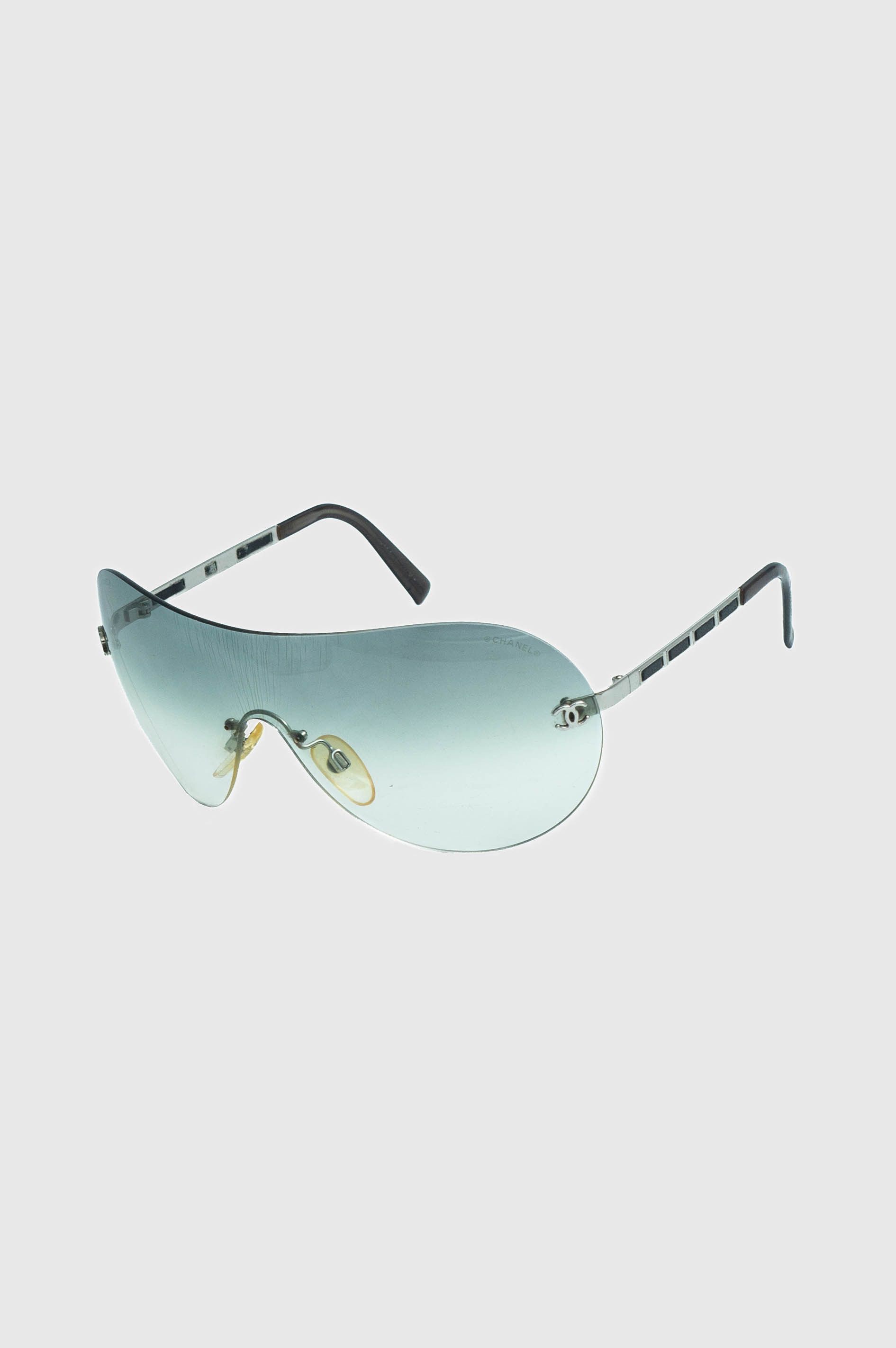 Chanel CHANEL Wrap Shield Silver Sunglasses Vintage 00s | Grailed