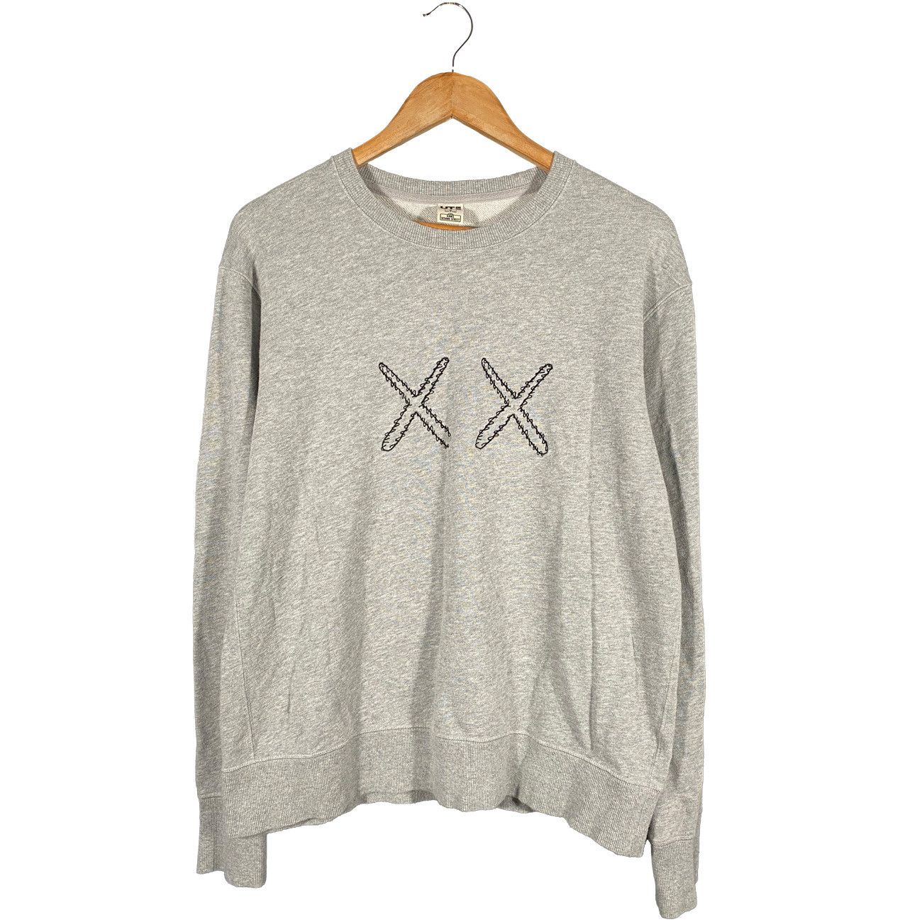 Kaws × Uniqlo KAWS x Uniqlo Sesame Street 'XX' Double Sided Sweatshirt ...