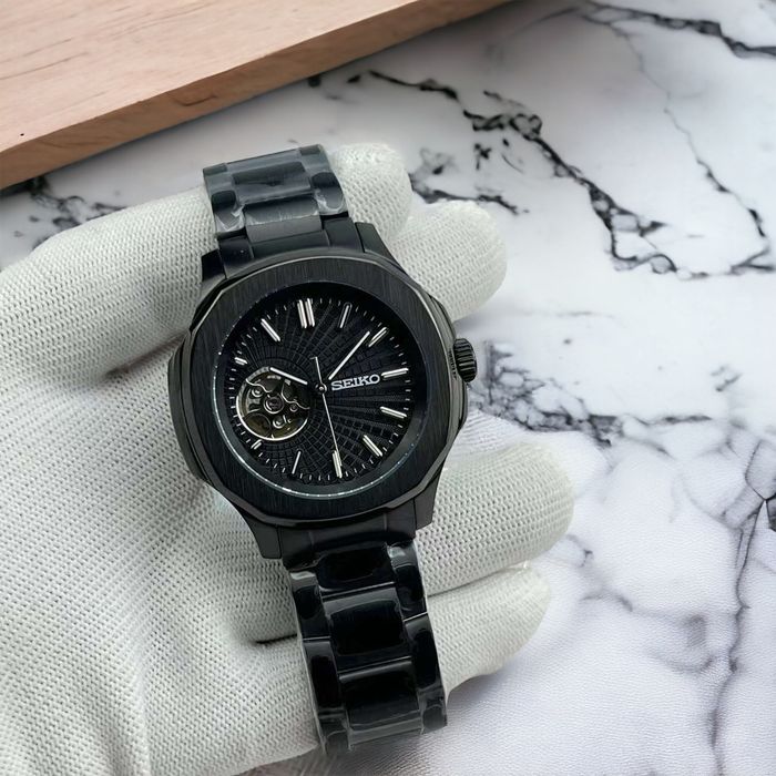 Seiko Seiko Mod Nautilus Black Open Heart Steel Automatic Watch | Grailed