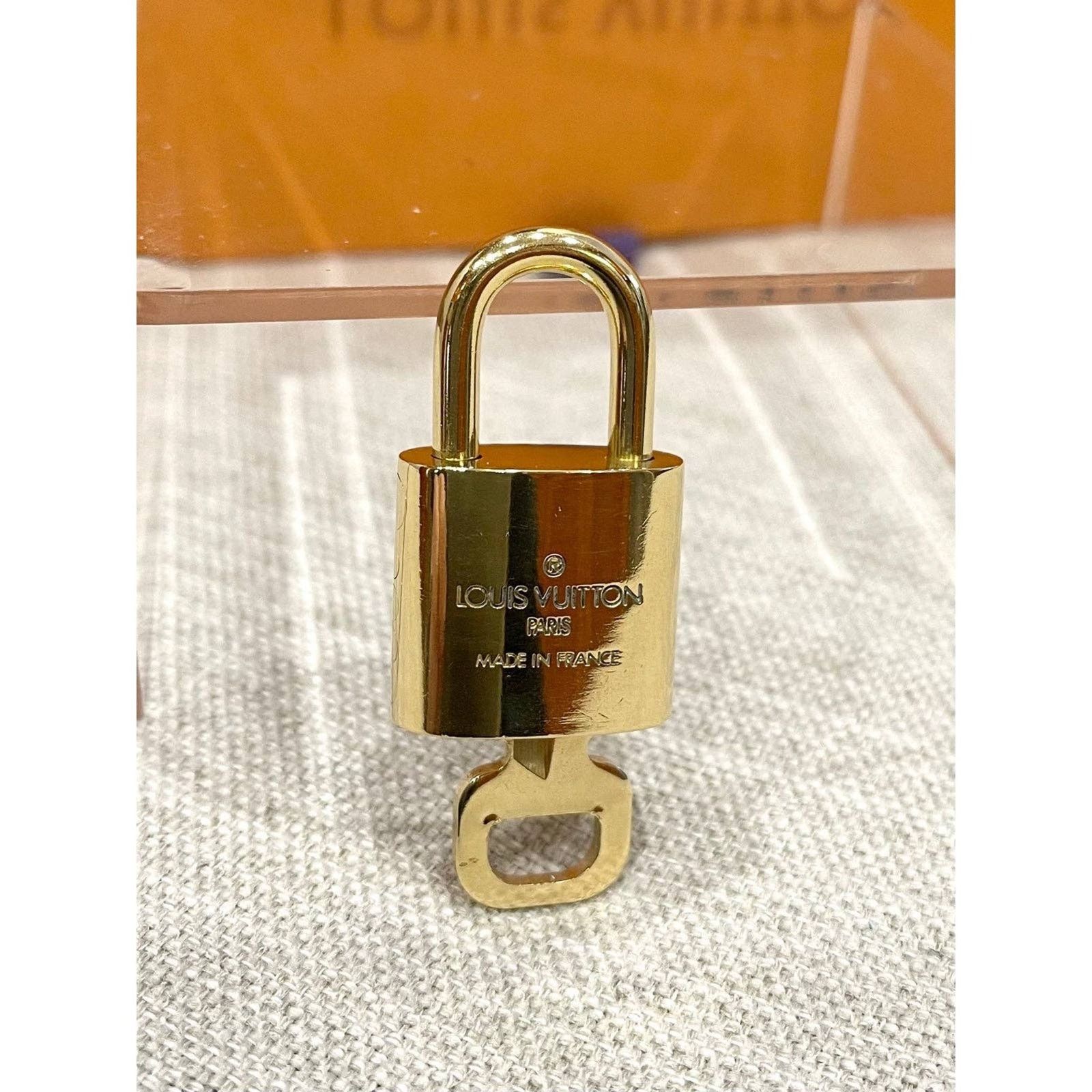 Louis Vuitton Louis Vuitton Lock and Key Set #323 Brass Gold | Grailed