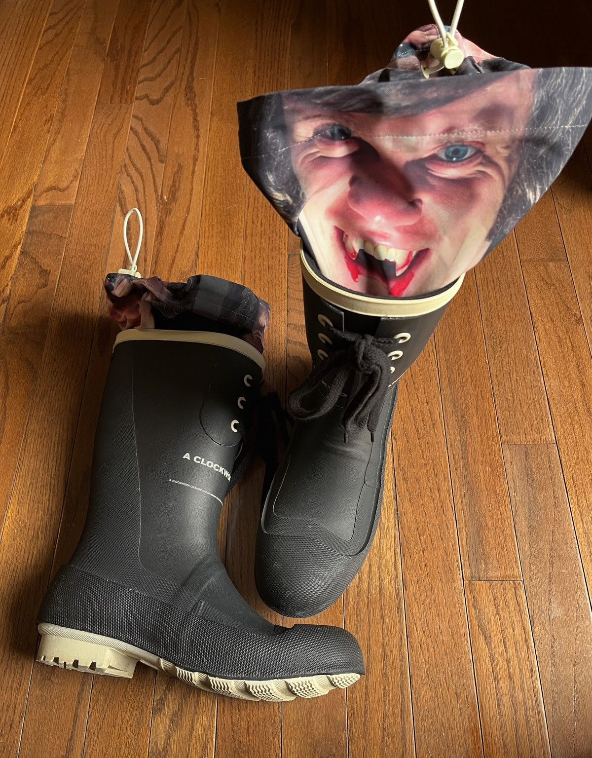 Undercover RUNWAY 🦇 A Clockwork Orange rain boots with knee covers FW19 ...