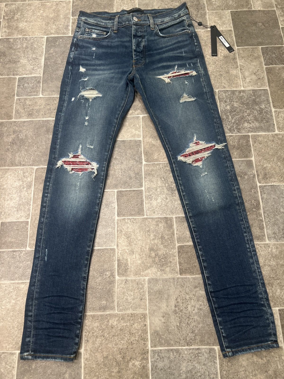 Amiri Amiri red bandana patch MX1 jeans | Grailed