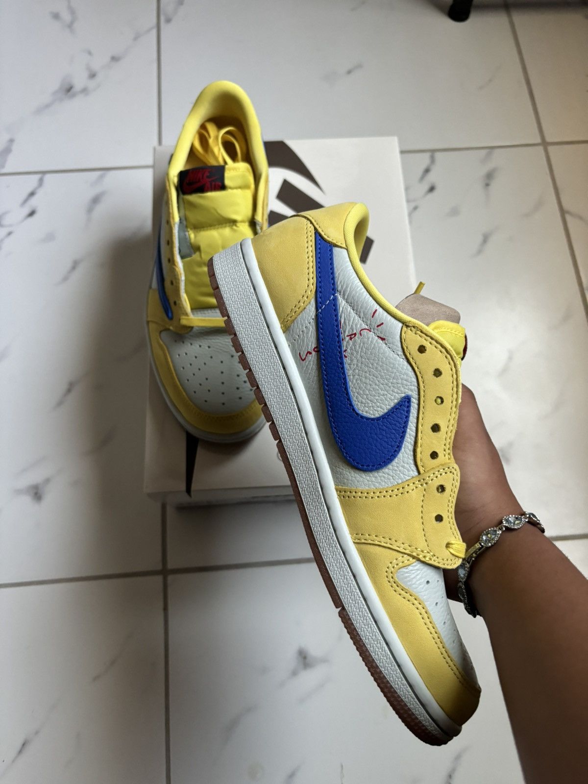 Travis Scott Jordan 1s low Travis Scott “Canary” | Grailed