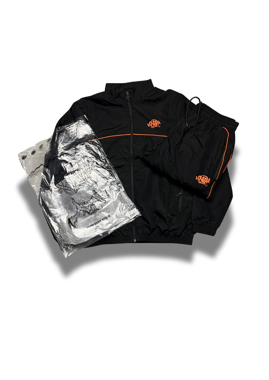 Designer × Streetwear Syna World Shell Tracksuit “BLACK/ORANGE” | Grailed