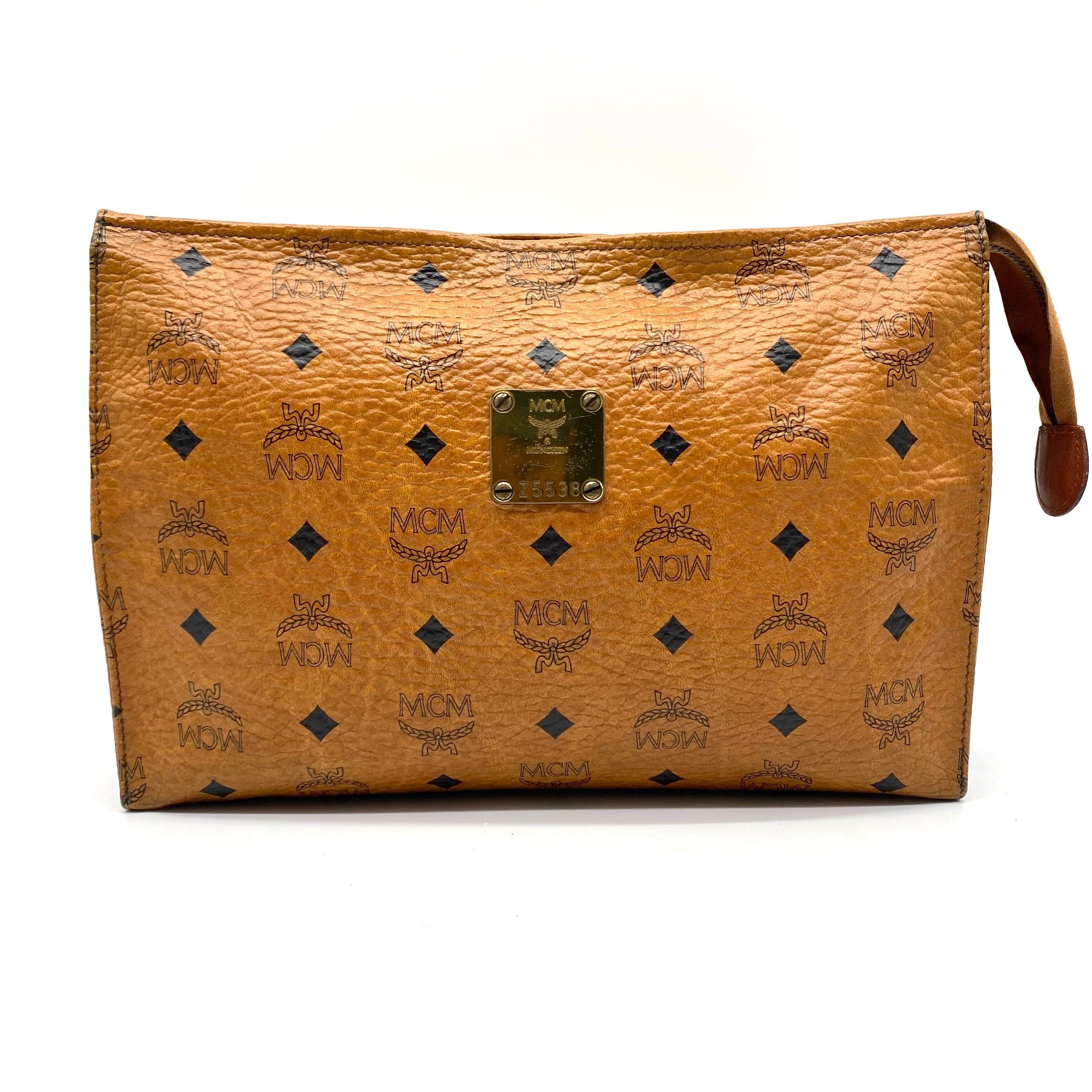 MCM MCM clutch bag all over pattern brown VISETOS | Grailed