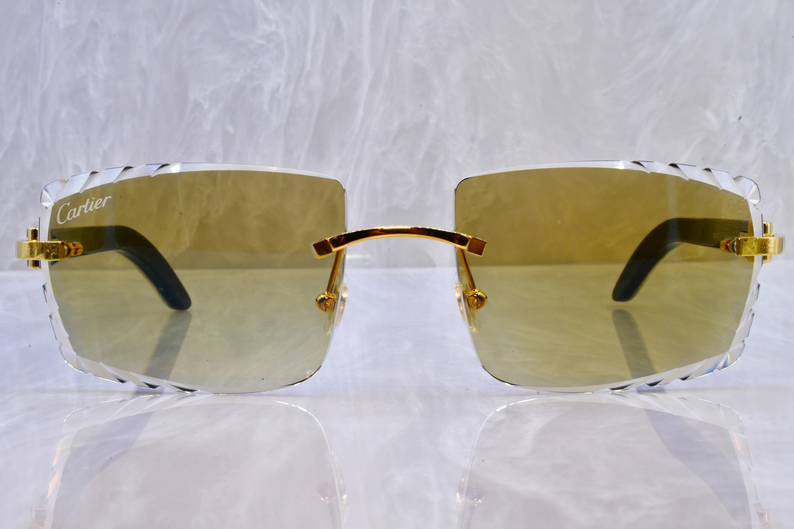 Cartier Cartier diamond cut horn sunglasses C decor buffs Transition ...