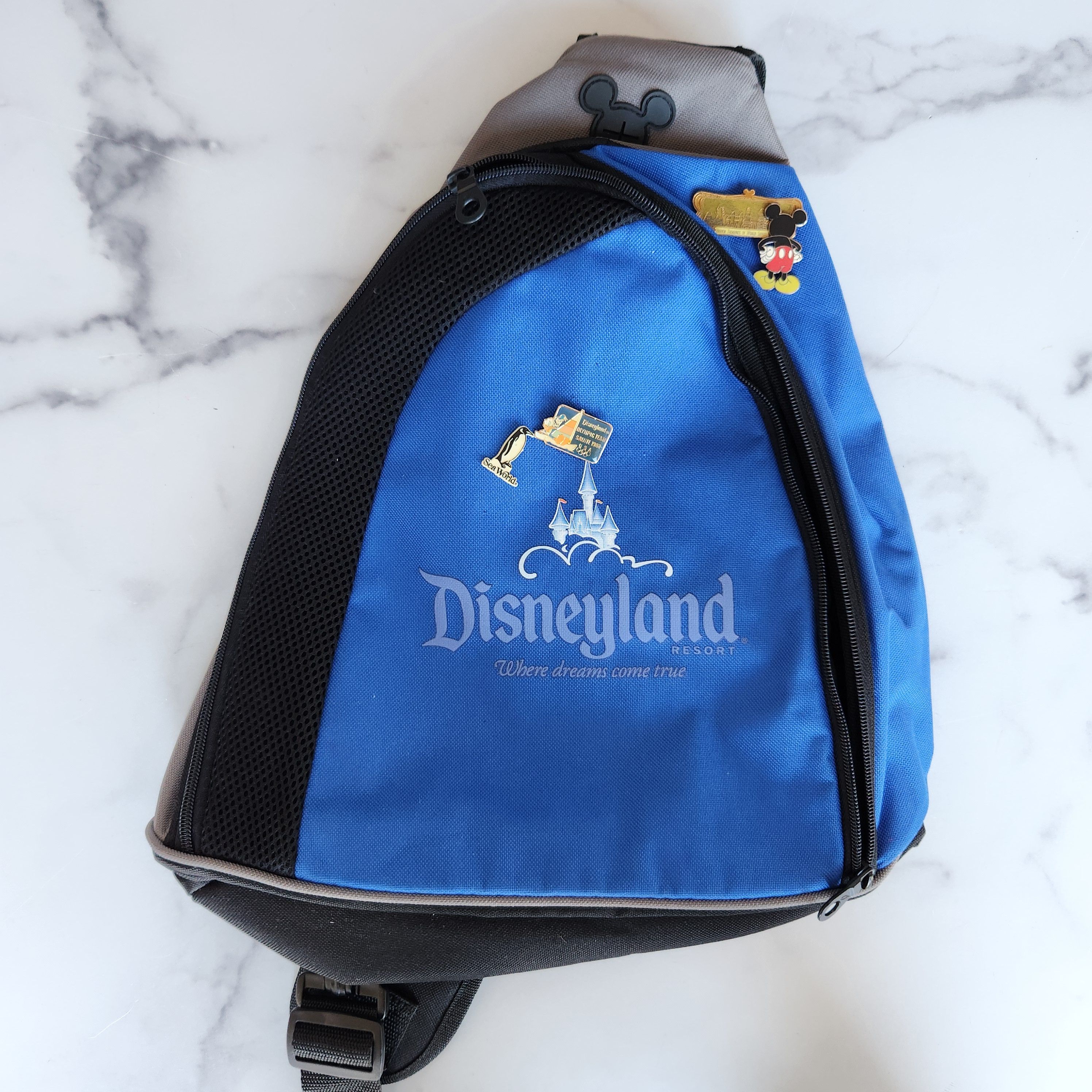 Disney 90s Disneyland one sling backpack 2 80's Disney Sea World | Grailed
