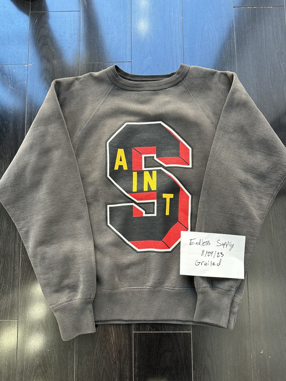 DENIM TEARS × Saint Michael Saint Tears Crewneck Sweater | Grailed