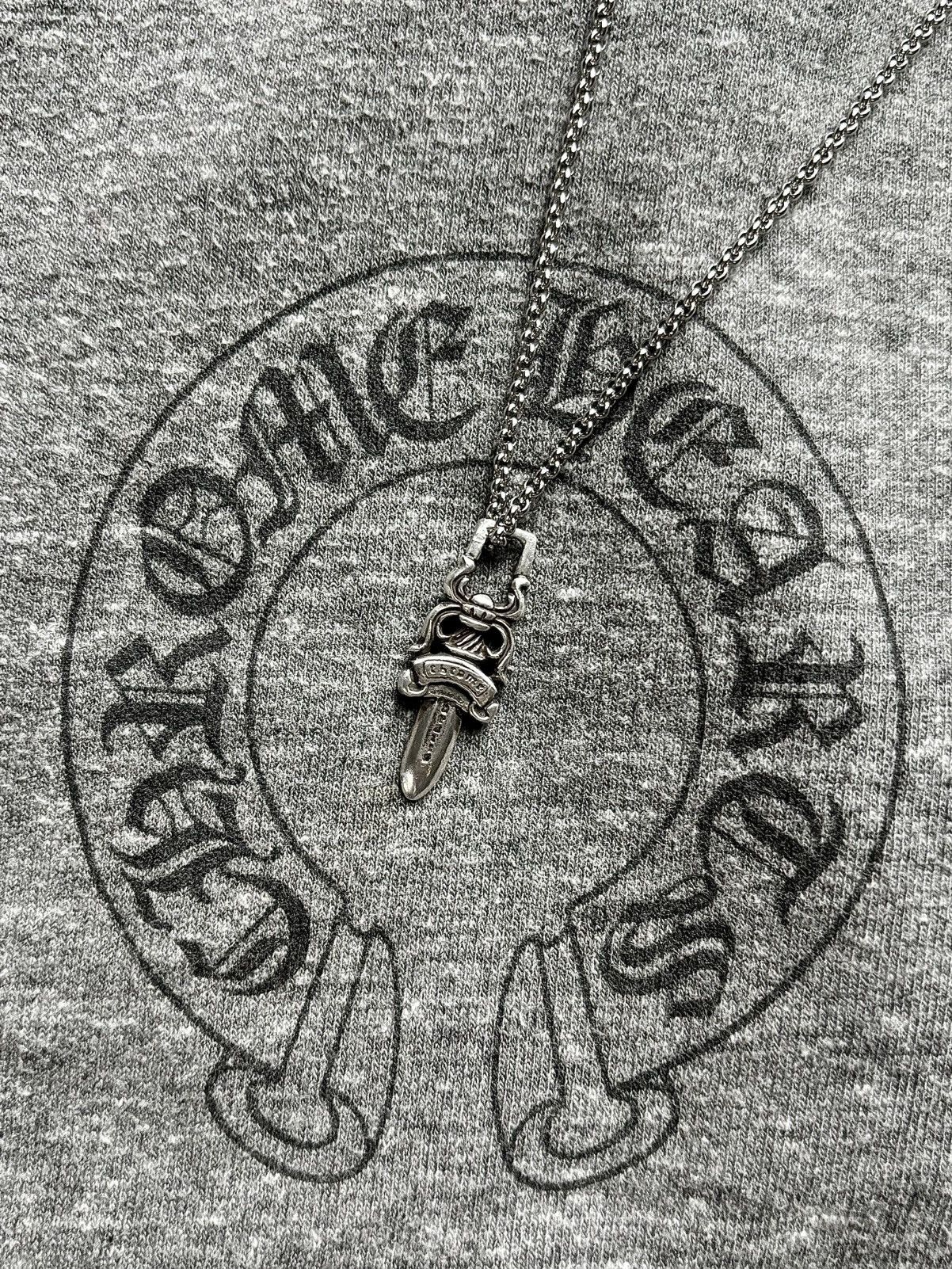 Vintage DAGGER ROLL CHAIN NECKLACE | Grailed