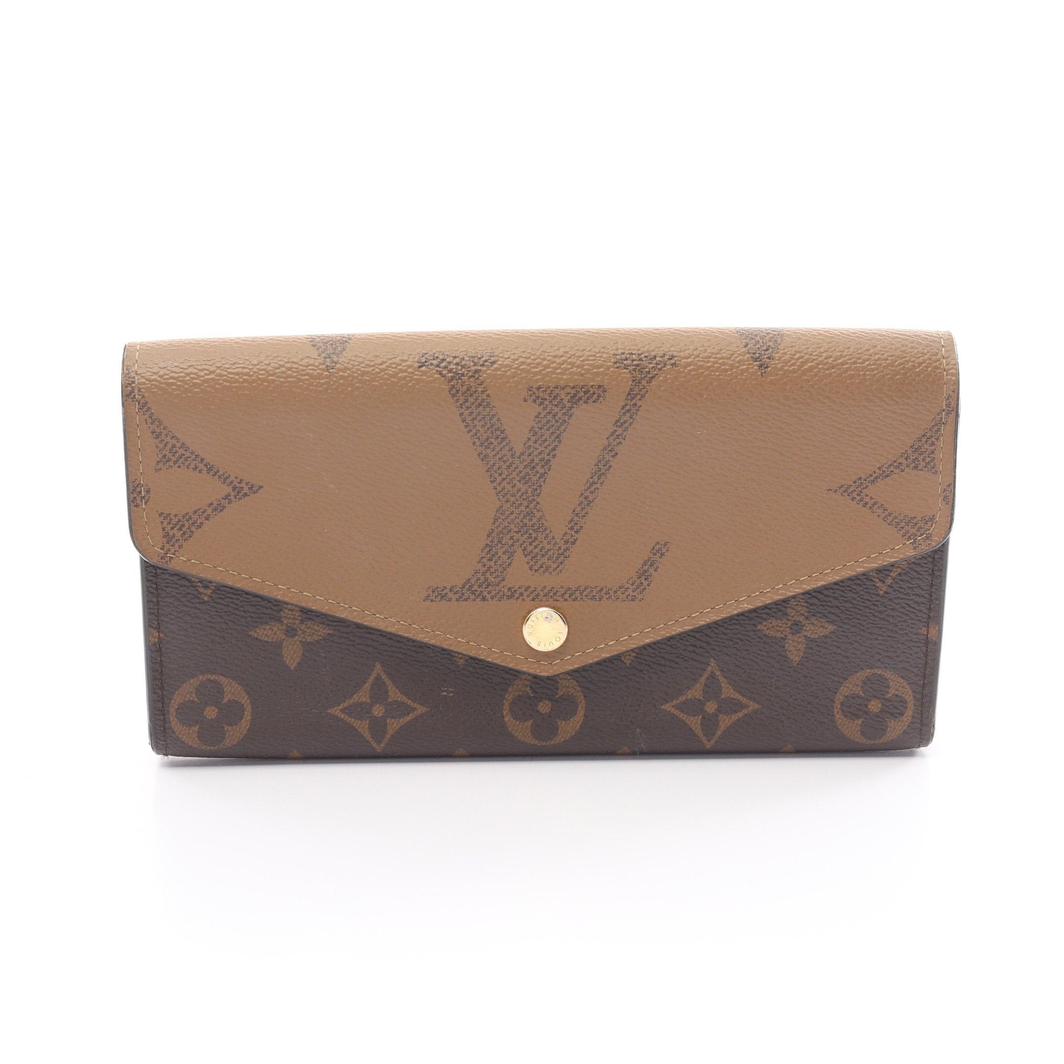 Louis Vuitton Louis Vuitton Portefeuil Sara Monogram Giant Reverse Bi ...