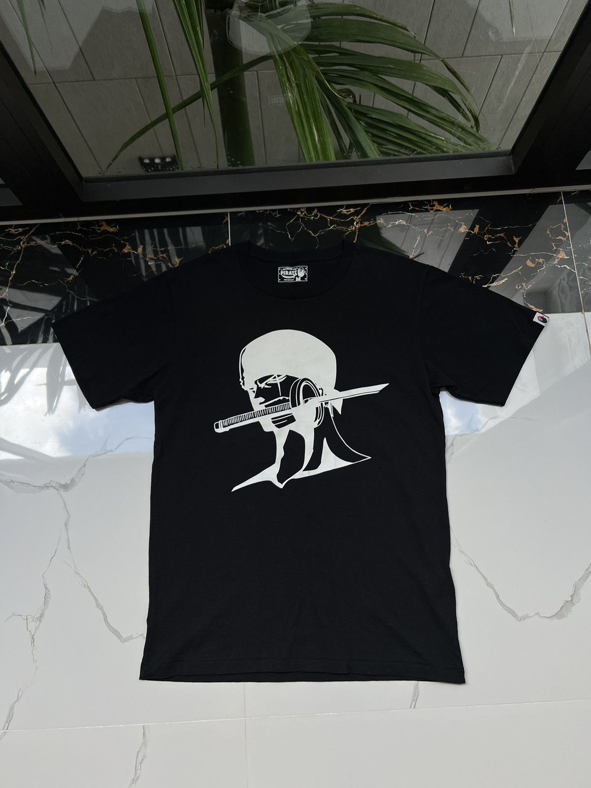 Bape × One Piece BAPE PIRATE STORE x ONE PIECE ZORO TEE | Grailed