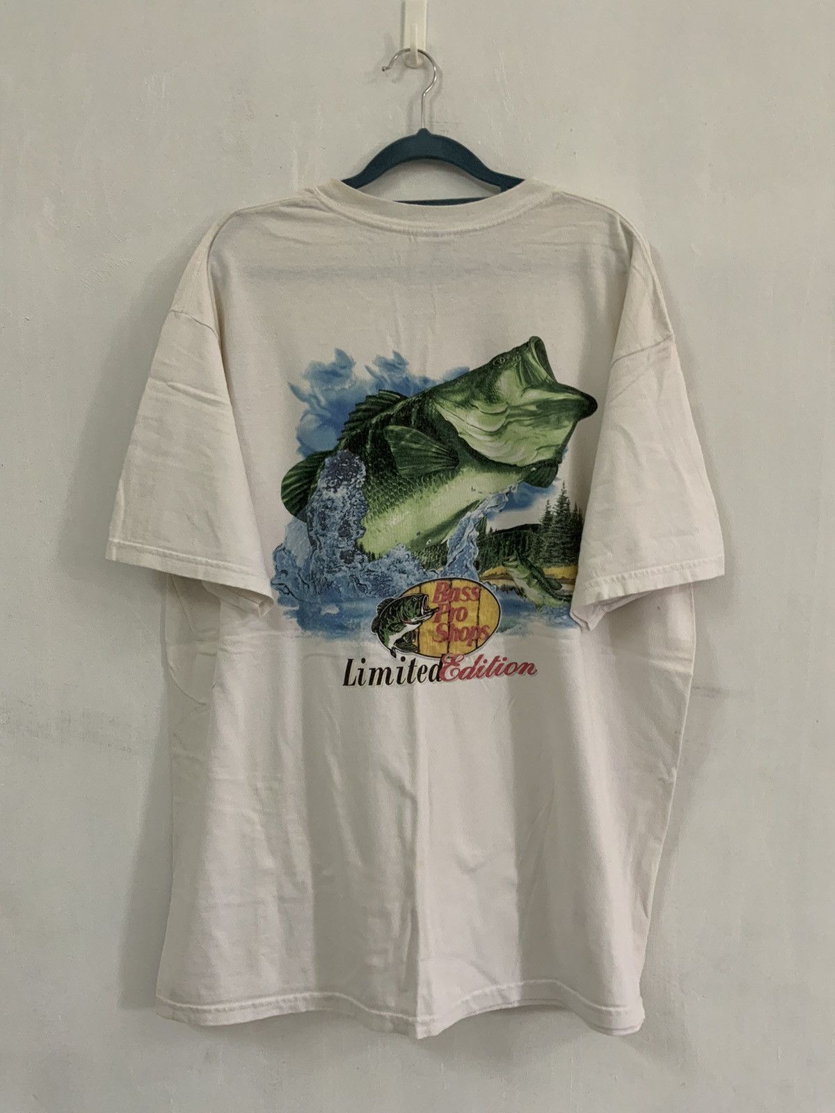 Archival Clothing Vintage Bass Pro Shops Big Logo Avant Garde Tee | Grailed