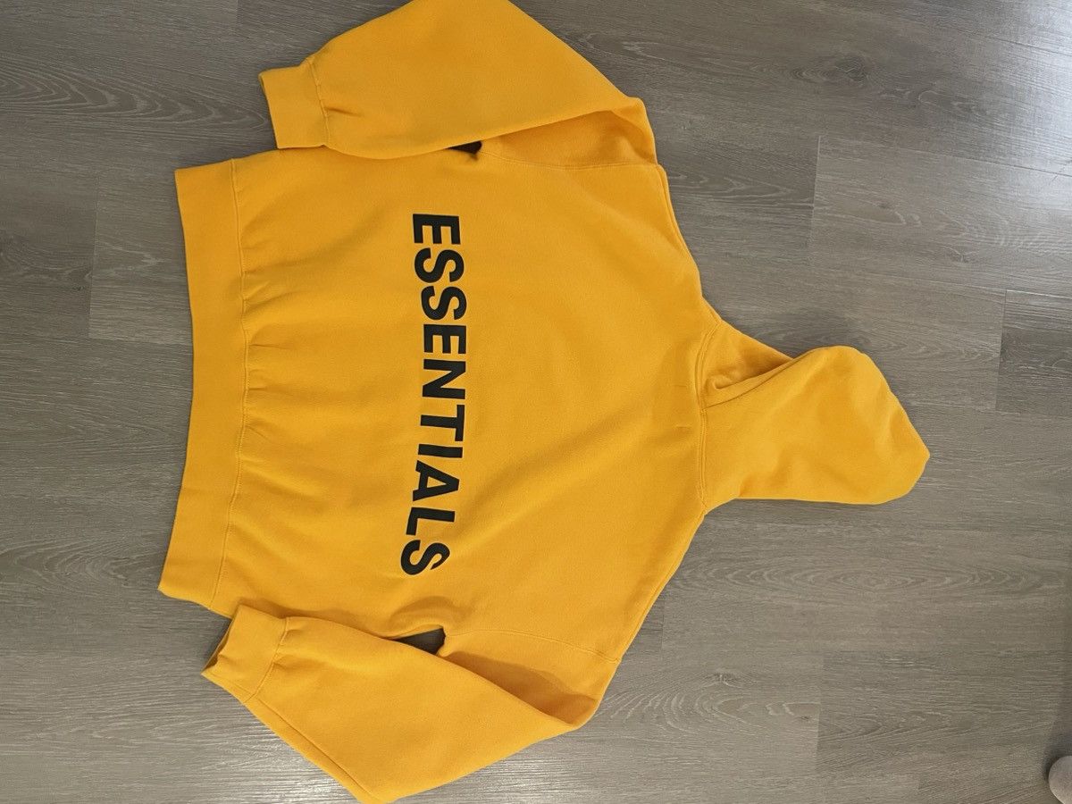 Essentials Fear of god essentials yellow hoodie orange | Grailed