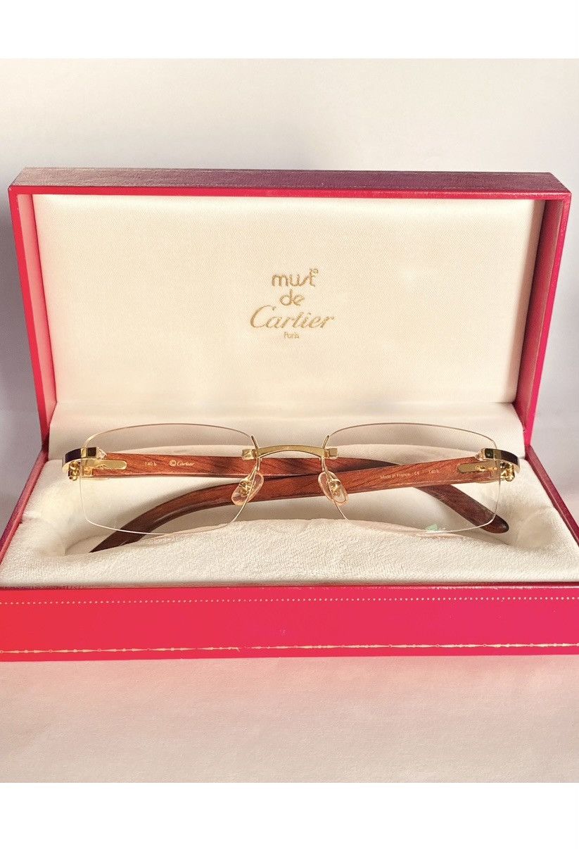 Cartier RARE 2000s CARTIER ZEBRA WOOD C DECOR GOLD RIMLESS FRAMES | Grailed