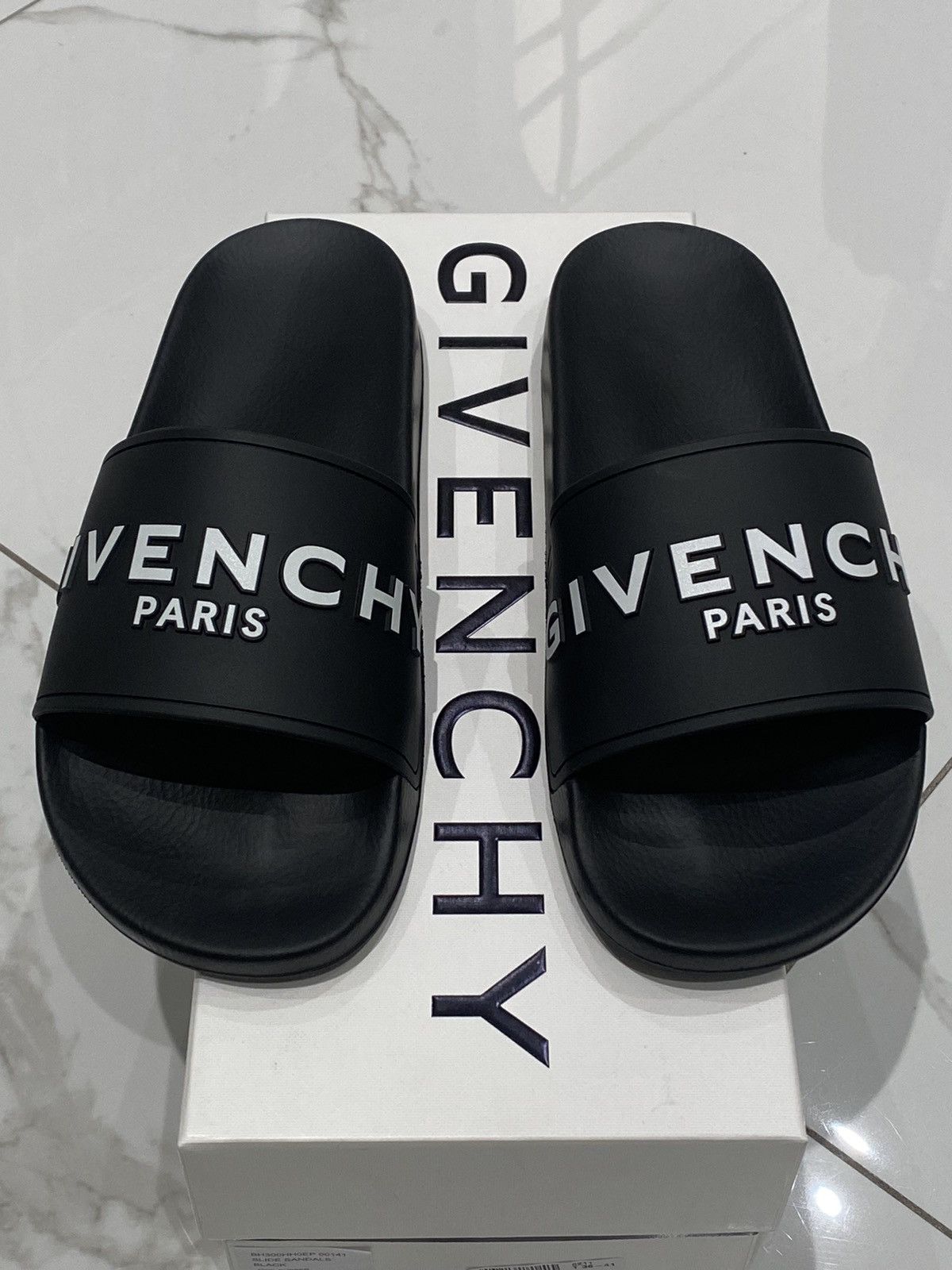 Givenchy Givenchy slide sandals in rubber | Grailed