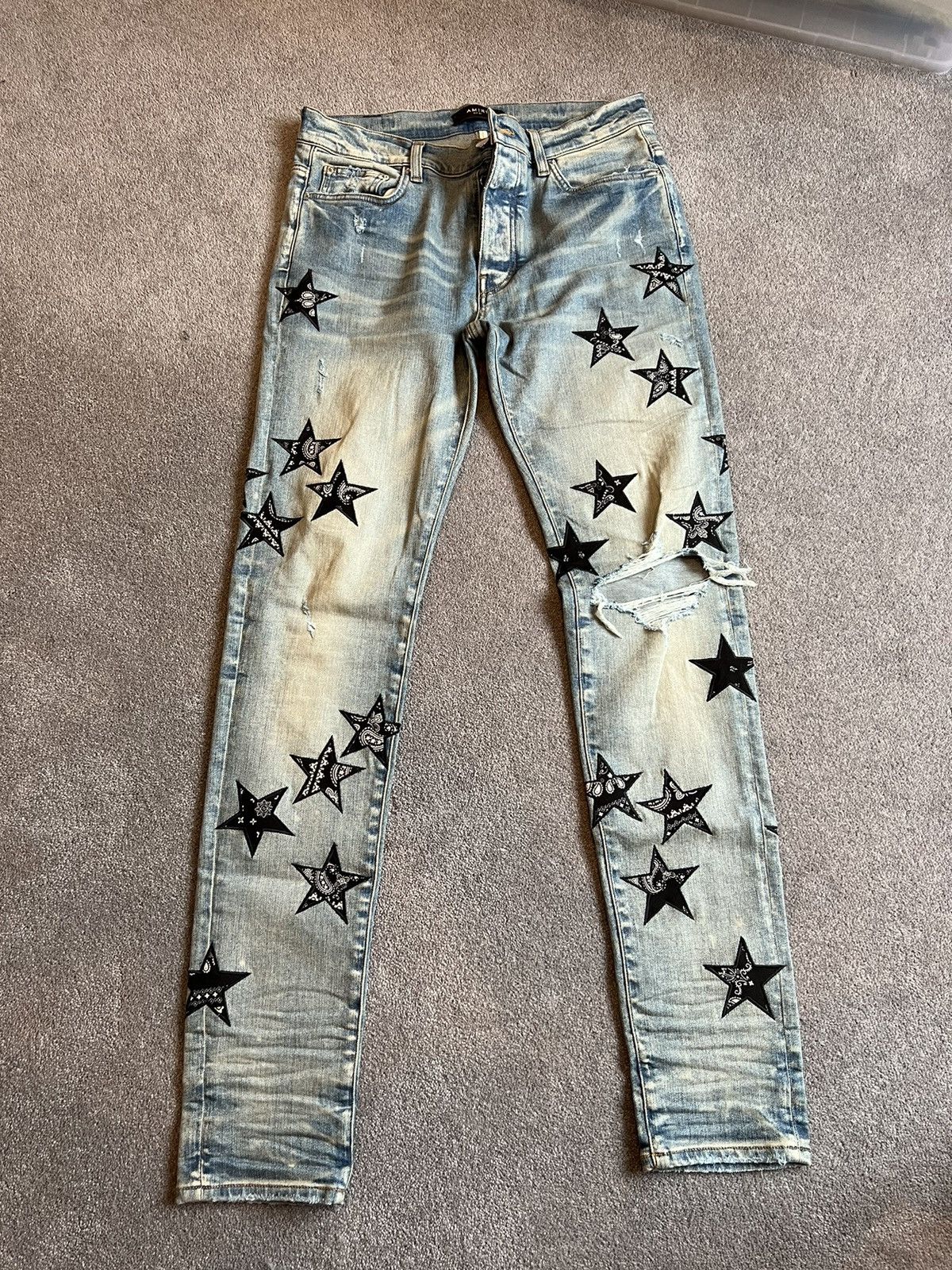Amiri Amiri bandana star patch jeans | Grailed