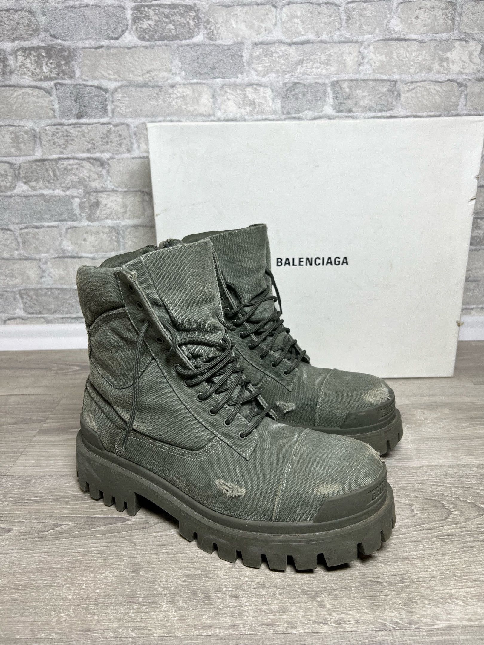Balenciaga Balenciaga Combat Strike Distressed Boots | Grailed