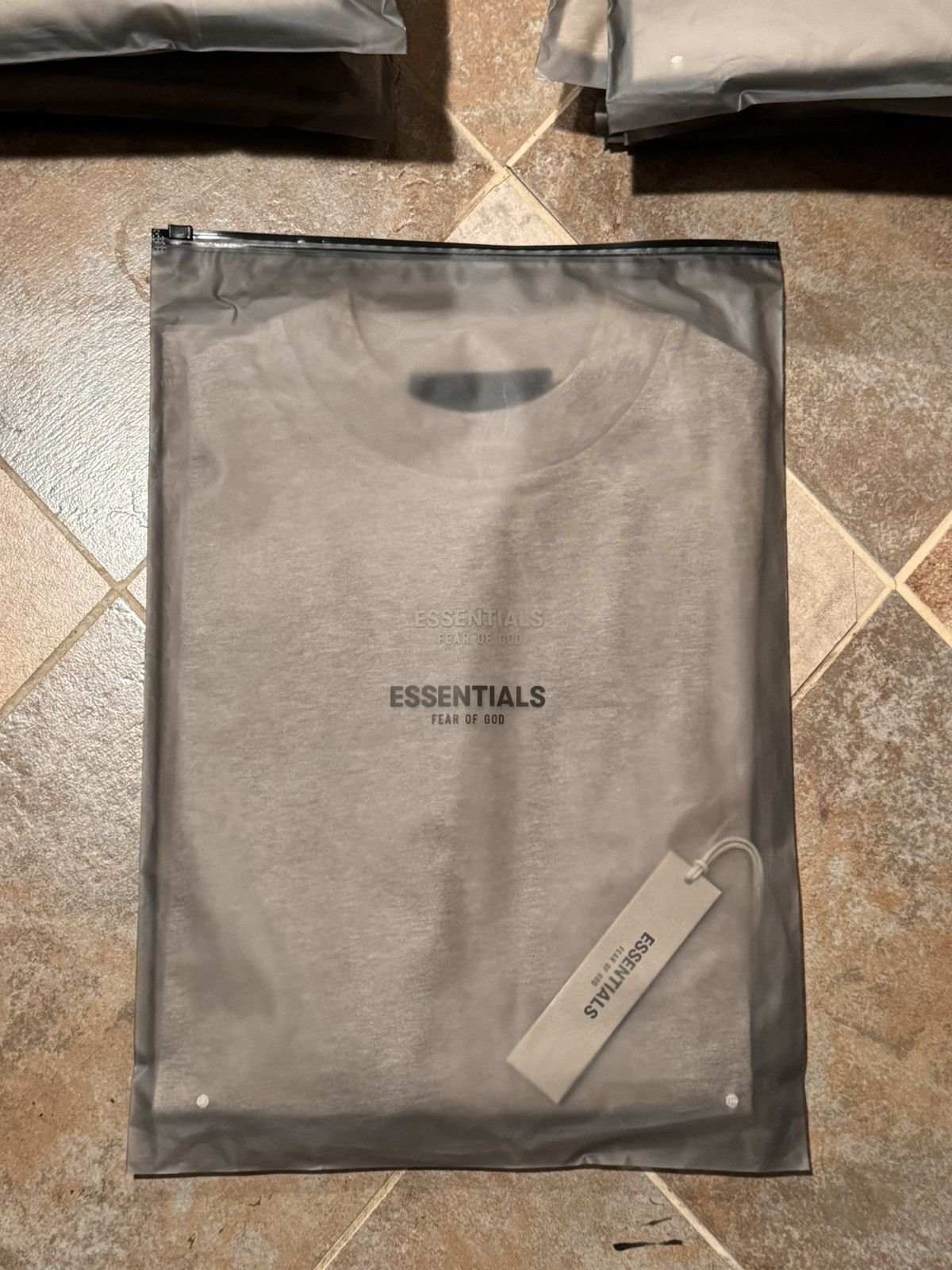 Fear of God Fear Of God Essentials “Core Heather” t shirt | Grailed