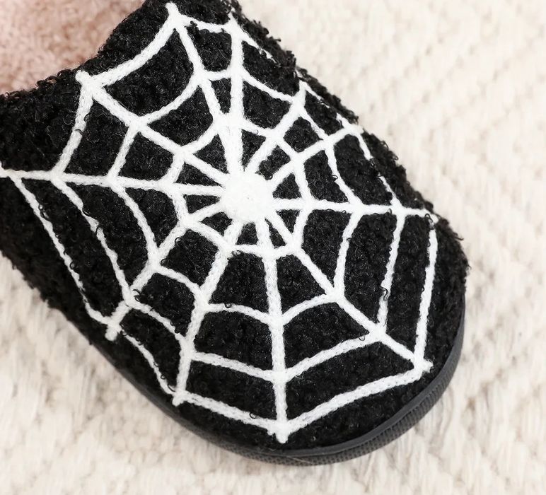 Designer fuzzy spider slippers. | Grailed