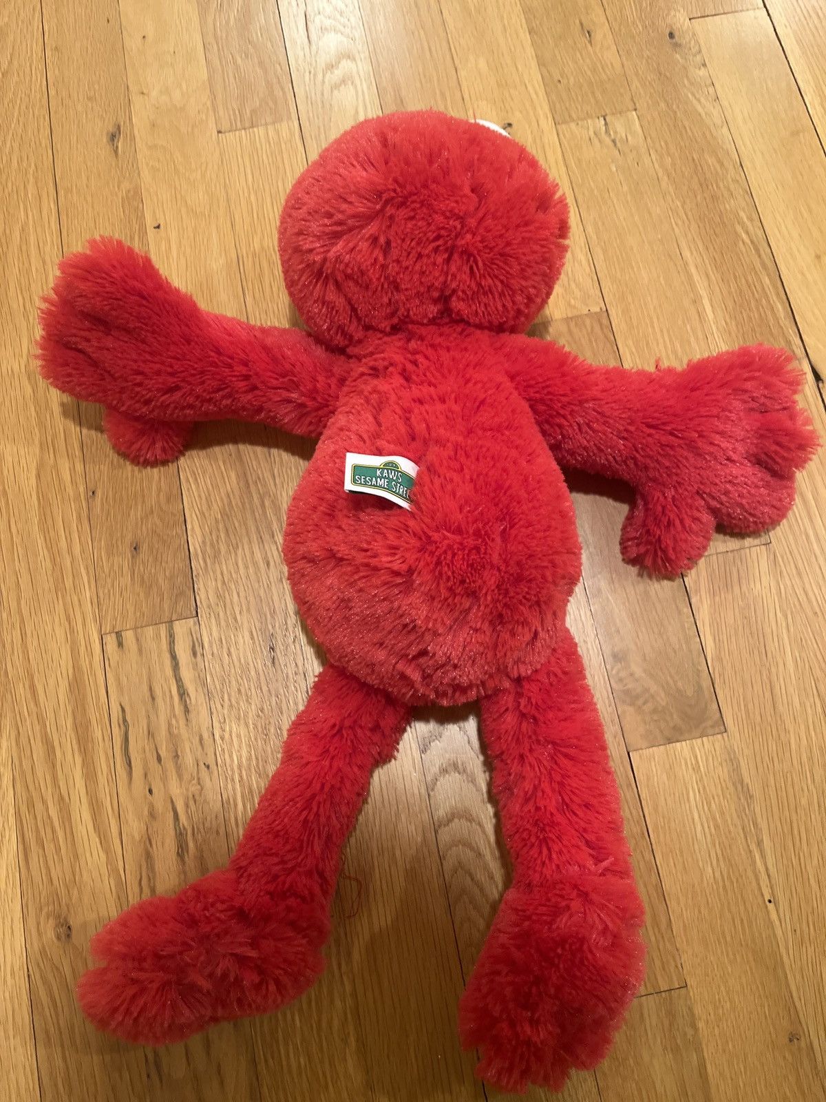 Kaws × Uniqlo Kaws Sesame Street Elmo Plush | Grailed