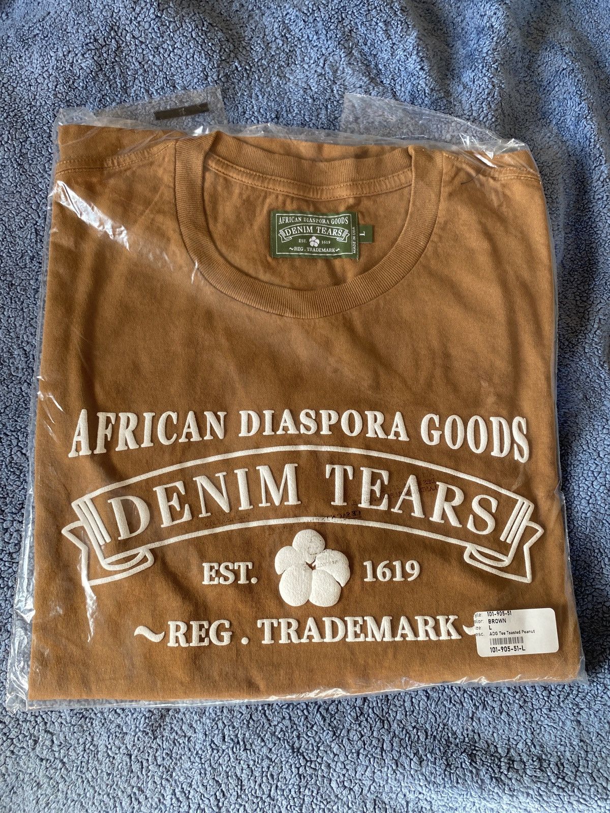 DENIM TEARS 3D bubble print tee puff puffer | Grailed