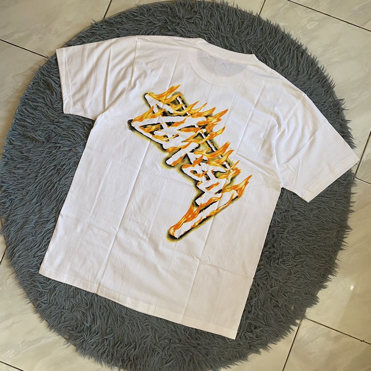 Streetwear × Stussy Stussy Burning Tee | Grailed