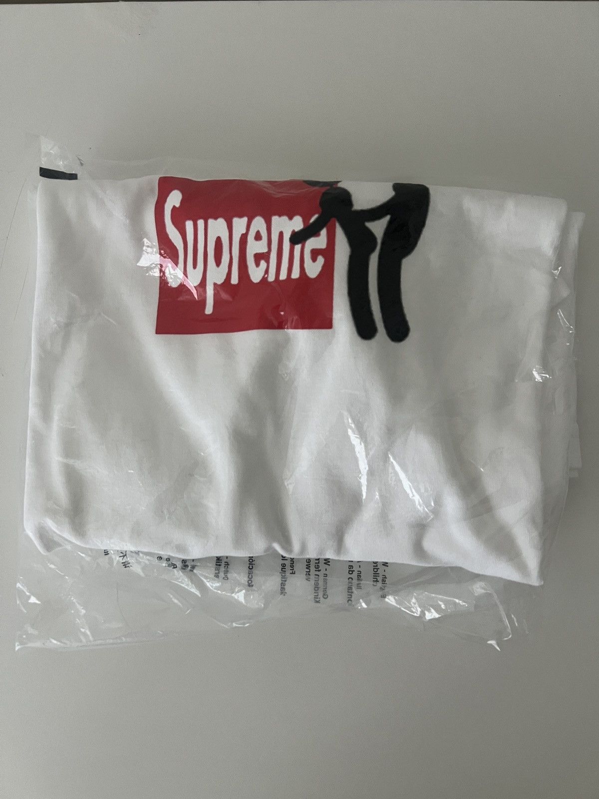 Supreme Supreme Stick figure shirt | Grailed