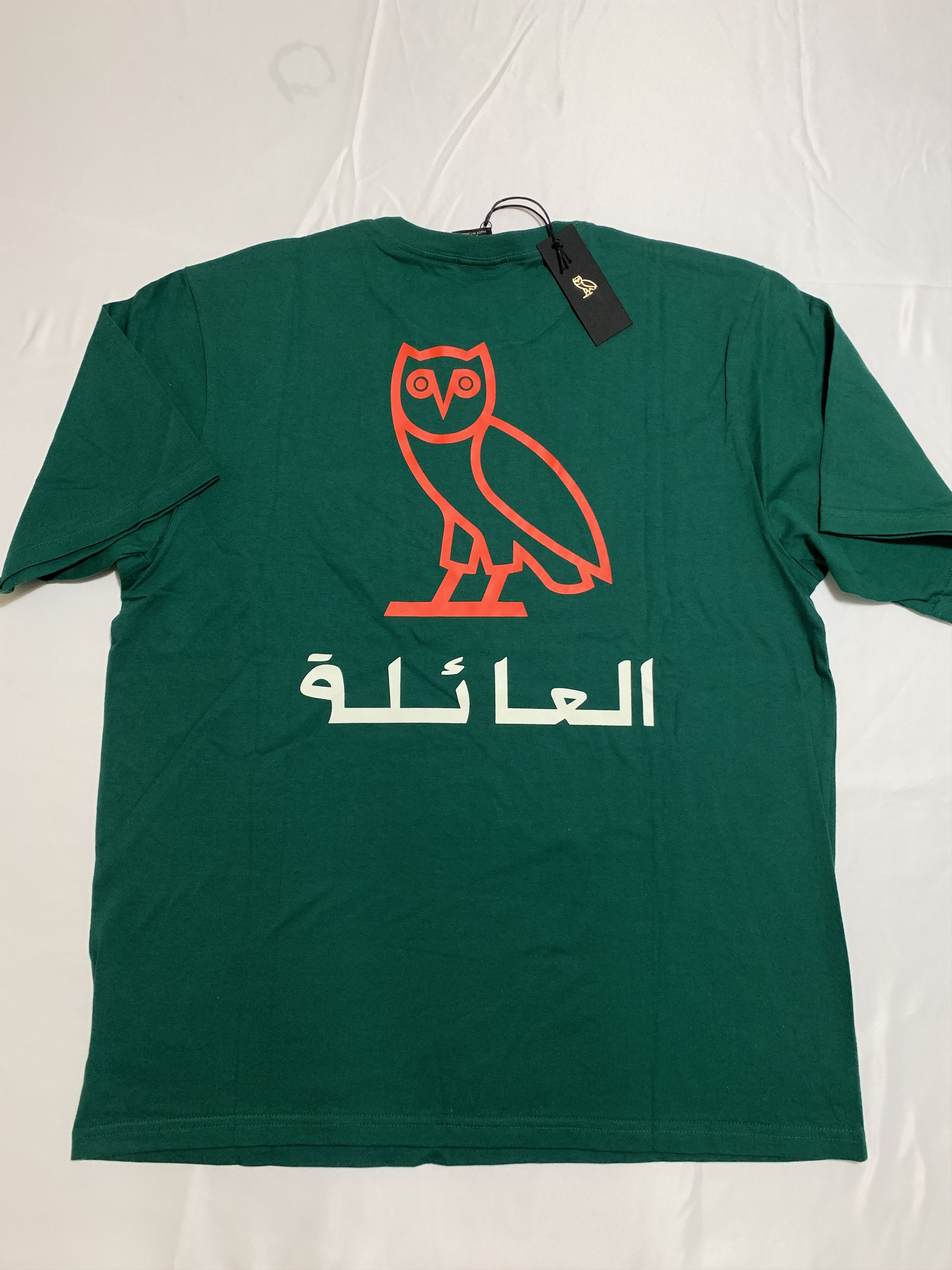 Drake × Octobers Very Own OVO FAMILY ARABIC POCKET T-SHIRT | Grailed