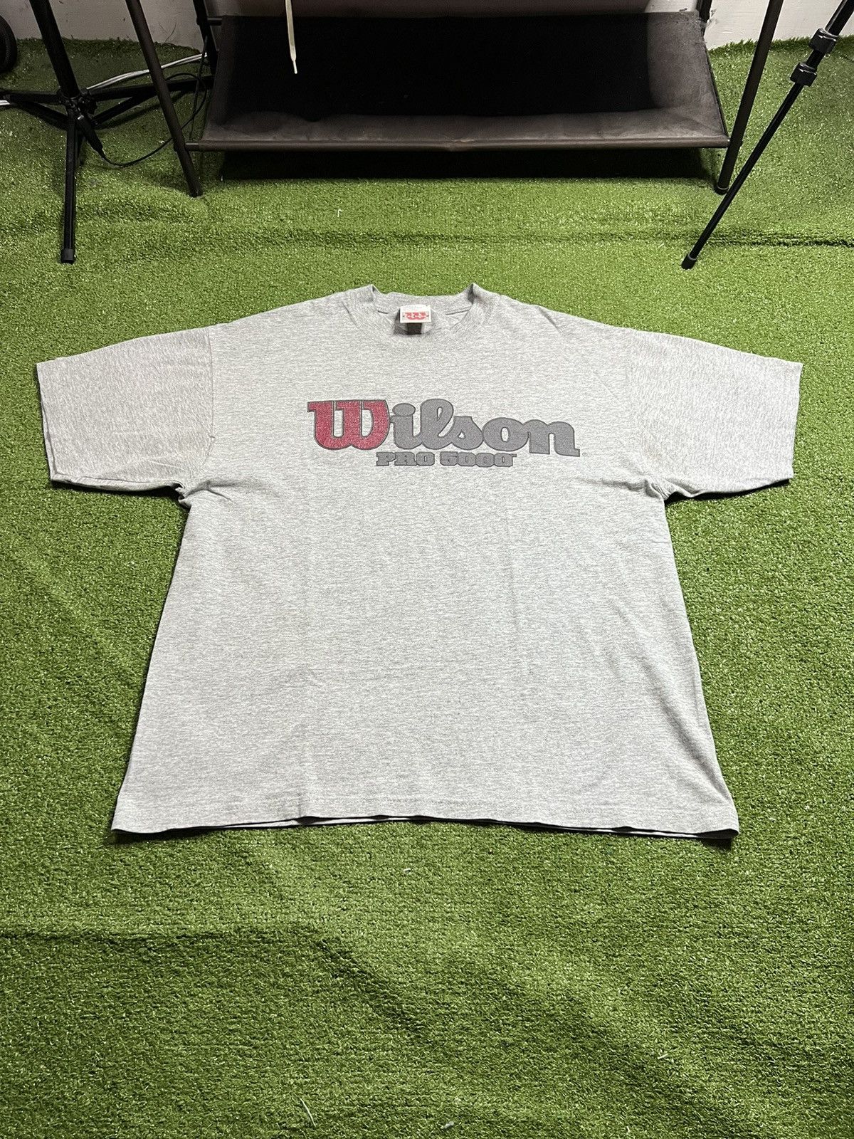 Vintage vintage wilson pro wear tennis grey spell out shirt | Grailed