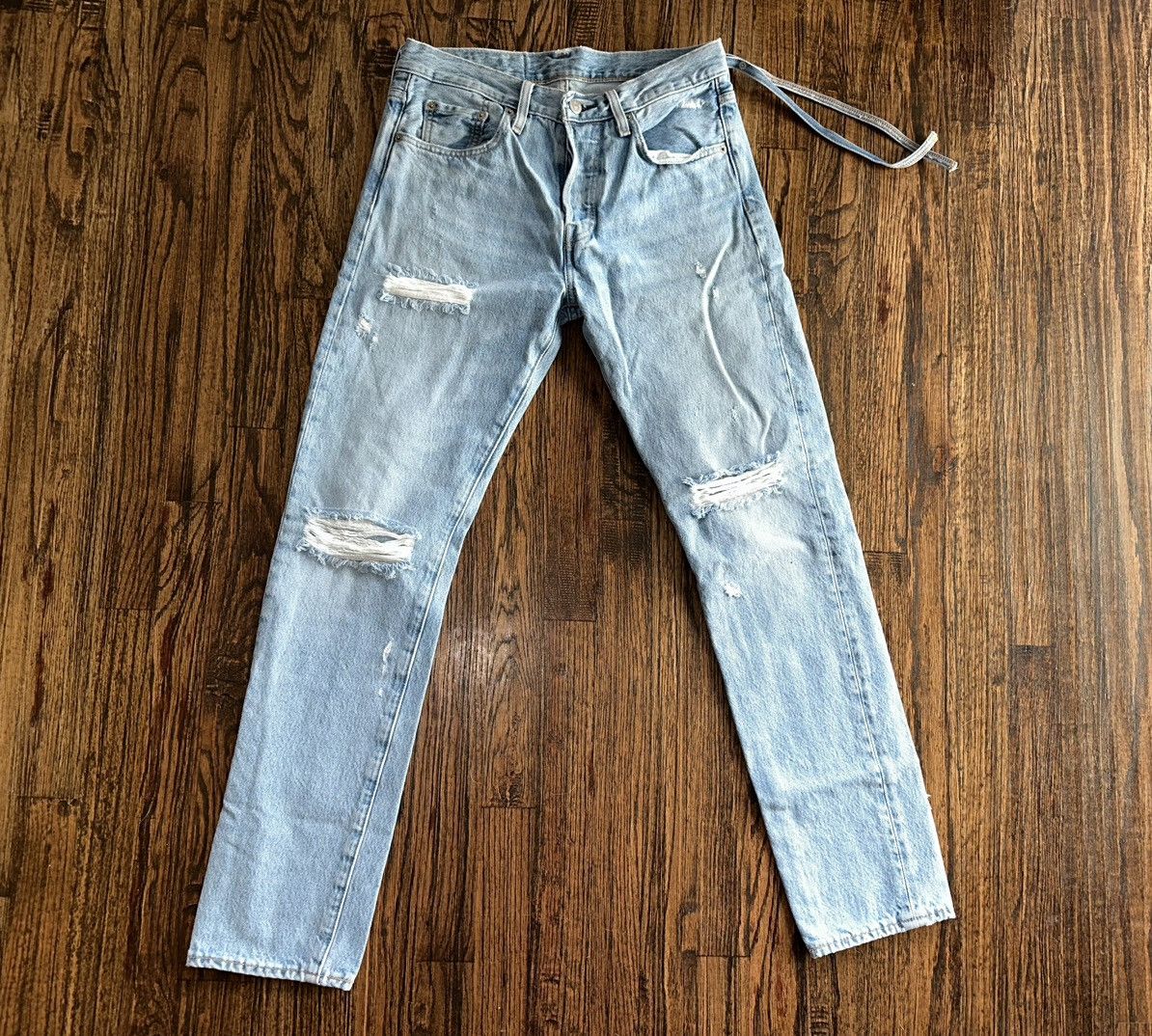 Kith × Levi's × Ronnie Fieg Kith x Levi's 501 Jeans Thrashed Blue Denim ...