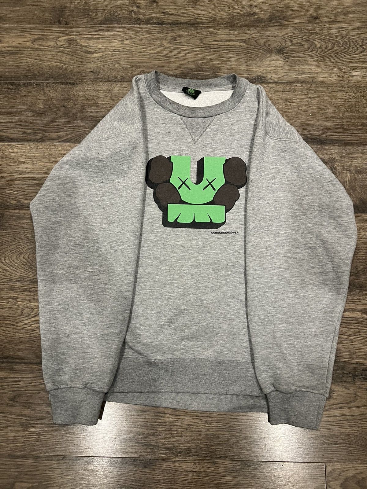 Undercover Undercover x Kaws 2001 Chaotic Discord Staff Sweater | Grailed