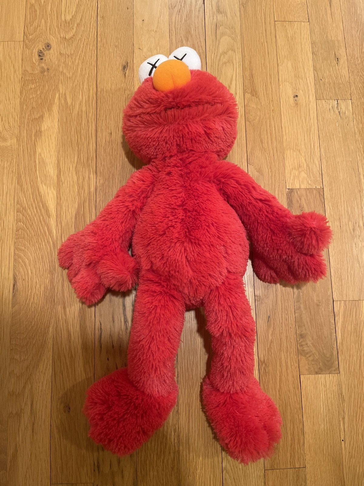 Kaws × Uniqlo Kaws Sesame Street Elmo Plush | Grailed