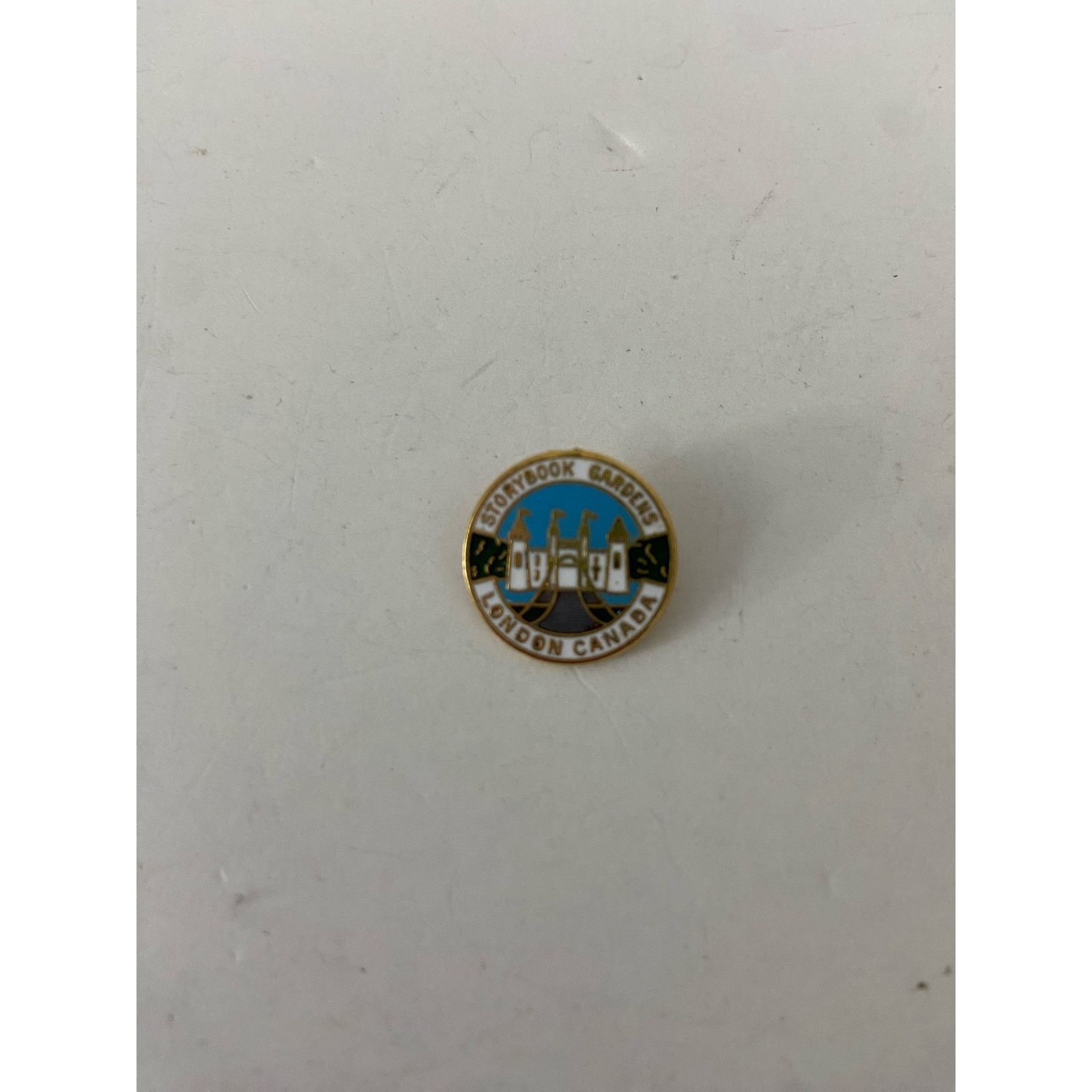 Generic Collectible storybook Gardens, pin, gold tone | Grailed