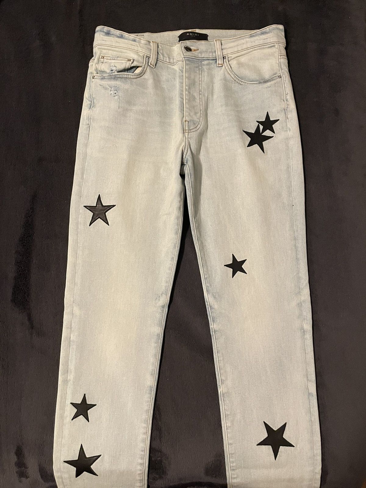 Amiri Amiri Light Wash Leather Star Patch Jeans | Grailed