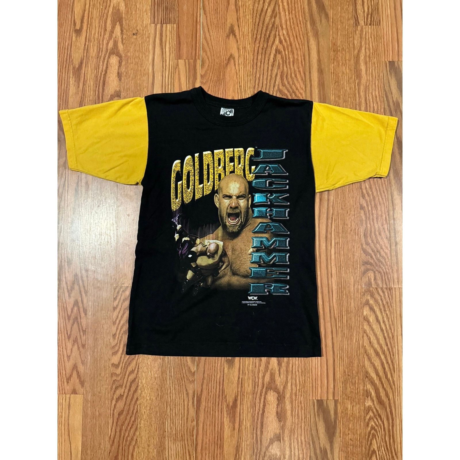 WCW/nWo True Vintage 90s Goldberg Jackhammer w/ yellow Sleeves | Grailed
