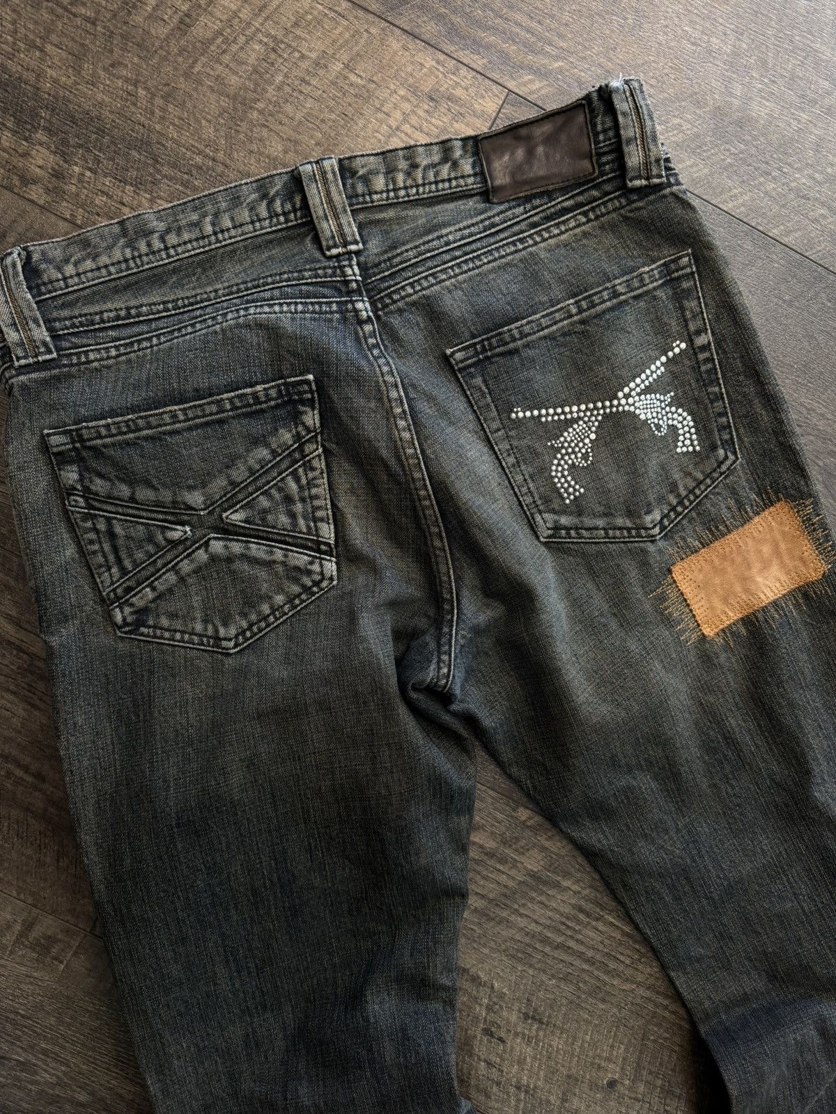 roarguns STUDDED GUNS DENIM PEACE PATCH FLARE JEANS | Grailed