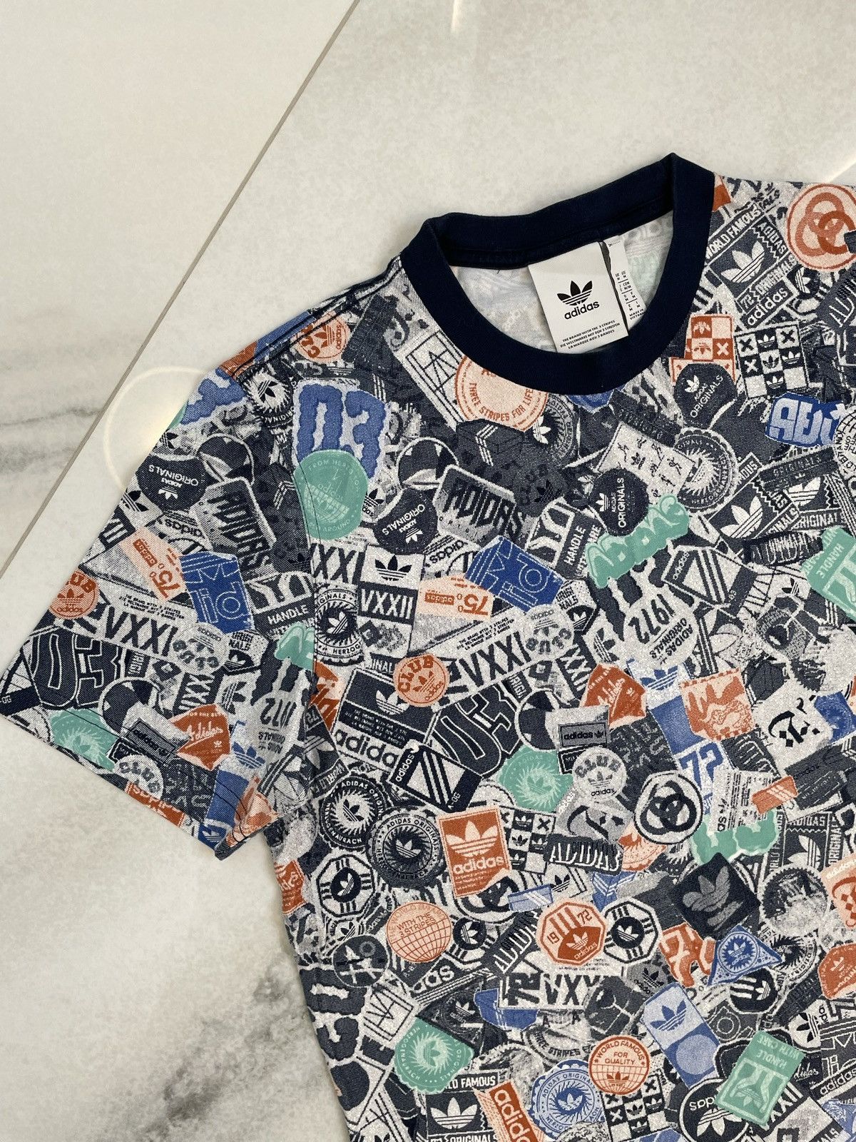 Adidas Adidas multicolour logo t shirts | Grailed