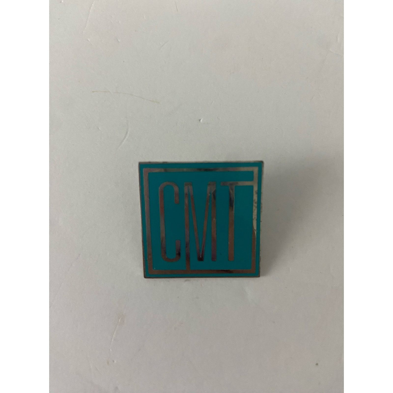 Generic Teal blue CMT pin | Grailed