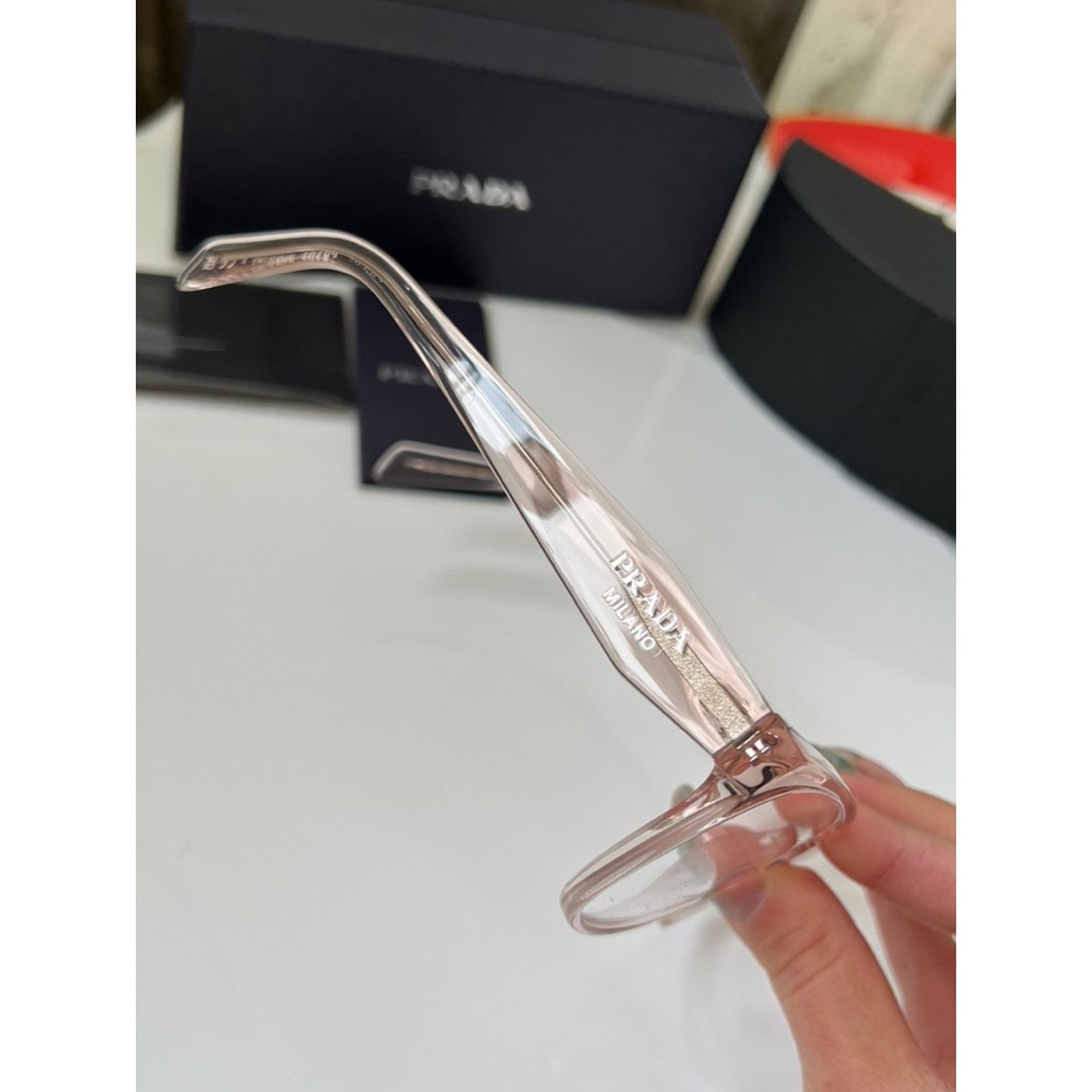 Prada NEW Prada PR17ZV Eyeglass Frames in Transparent Pink | Grailed