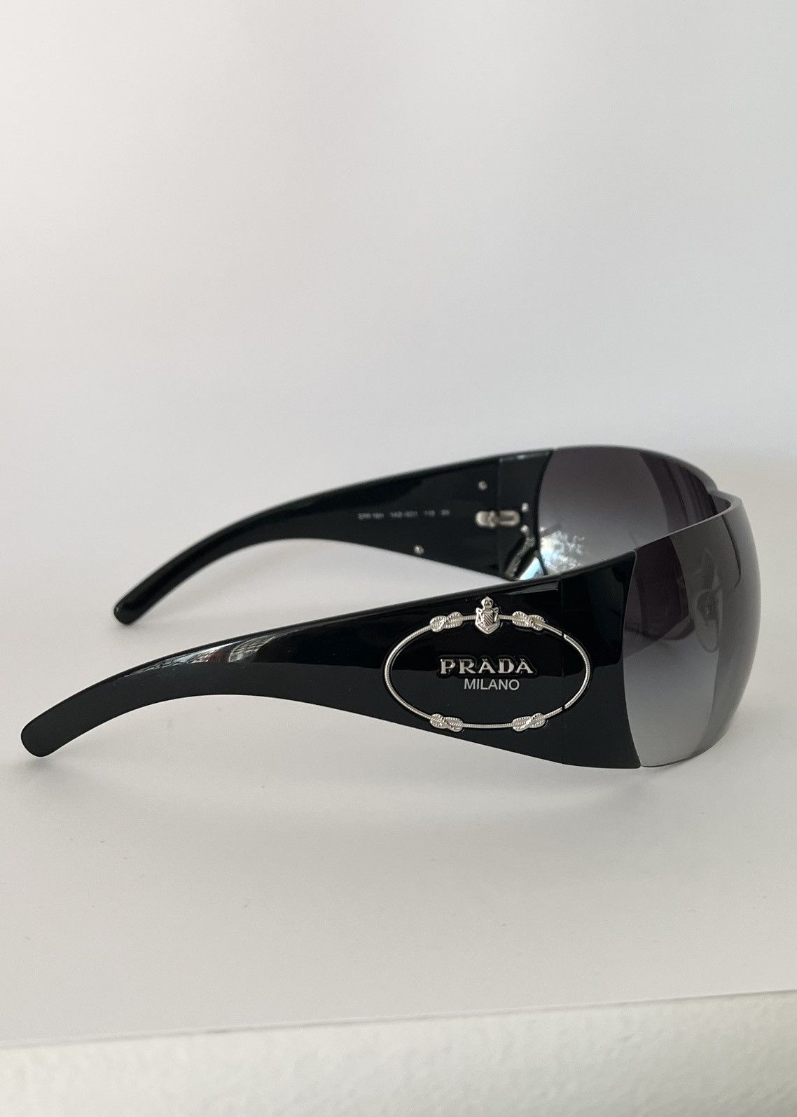 Prada 2000s Prada mask/shield black sunglasses with logo. | Grailed